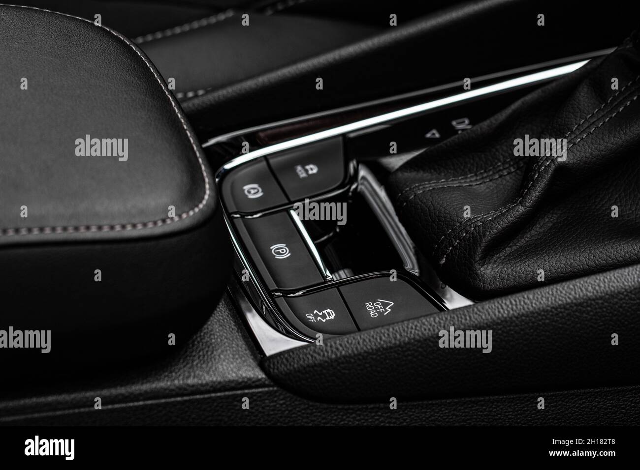 Electric handbrake button of modern car. Modern parking brake close up ...