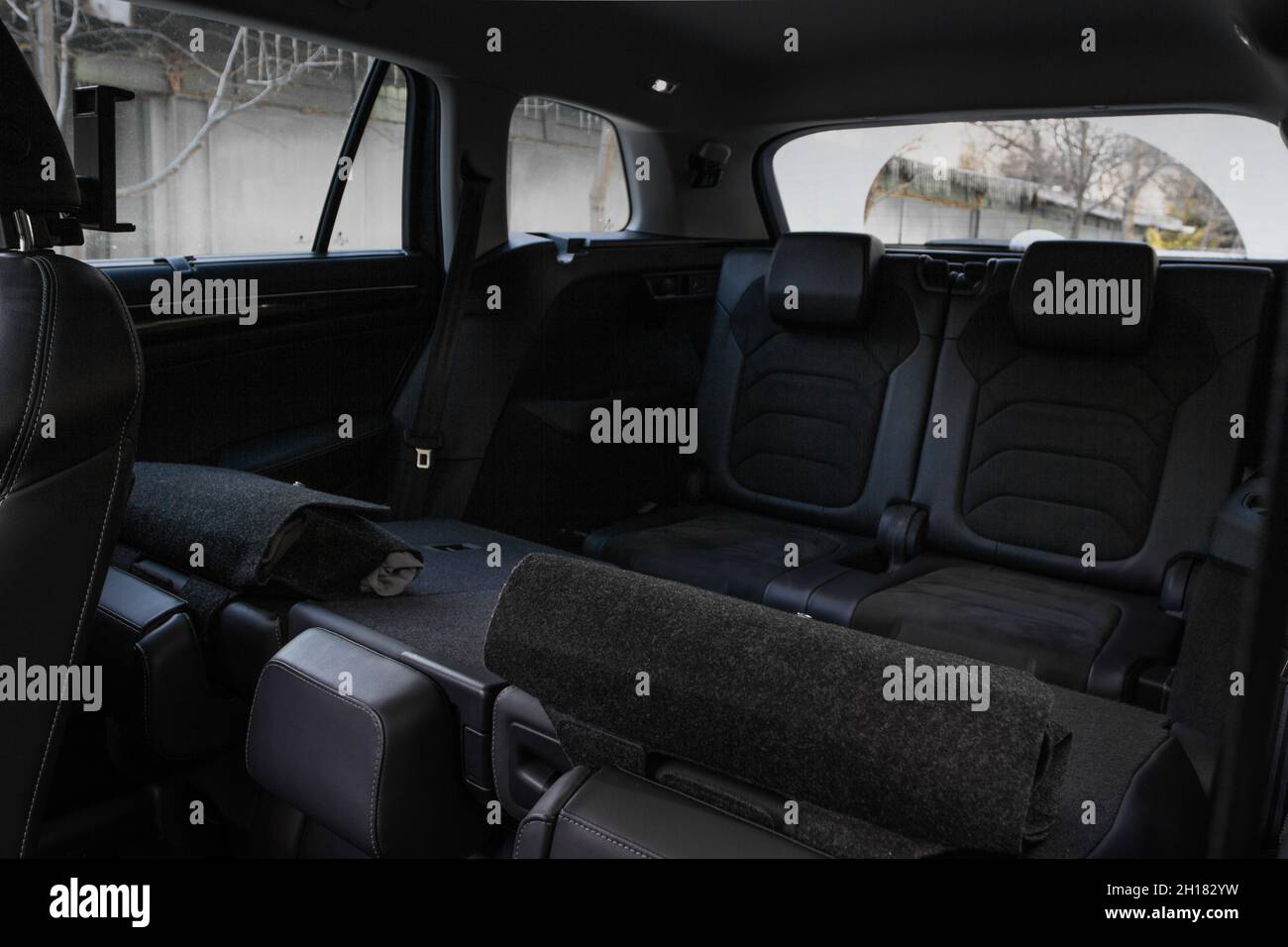 Folding seats and a cargo space inside suv car. Modern car interior ...