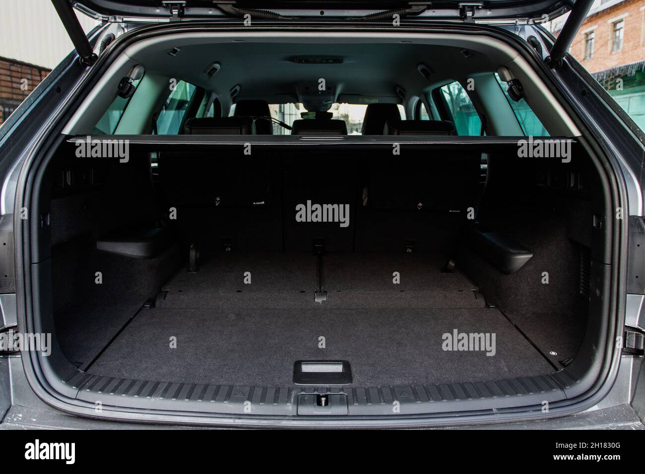 Huge, clean and empty car trunk in interior of a modern compact suv ...