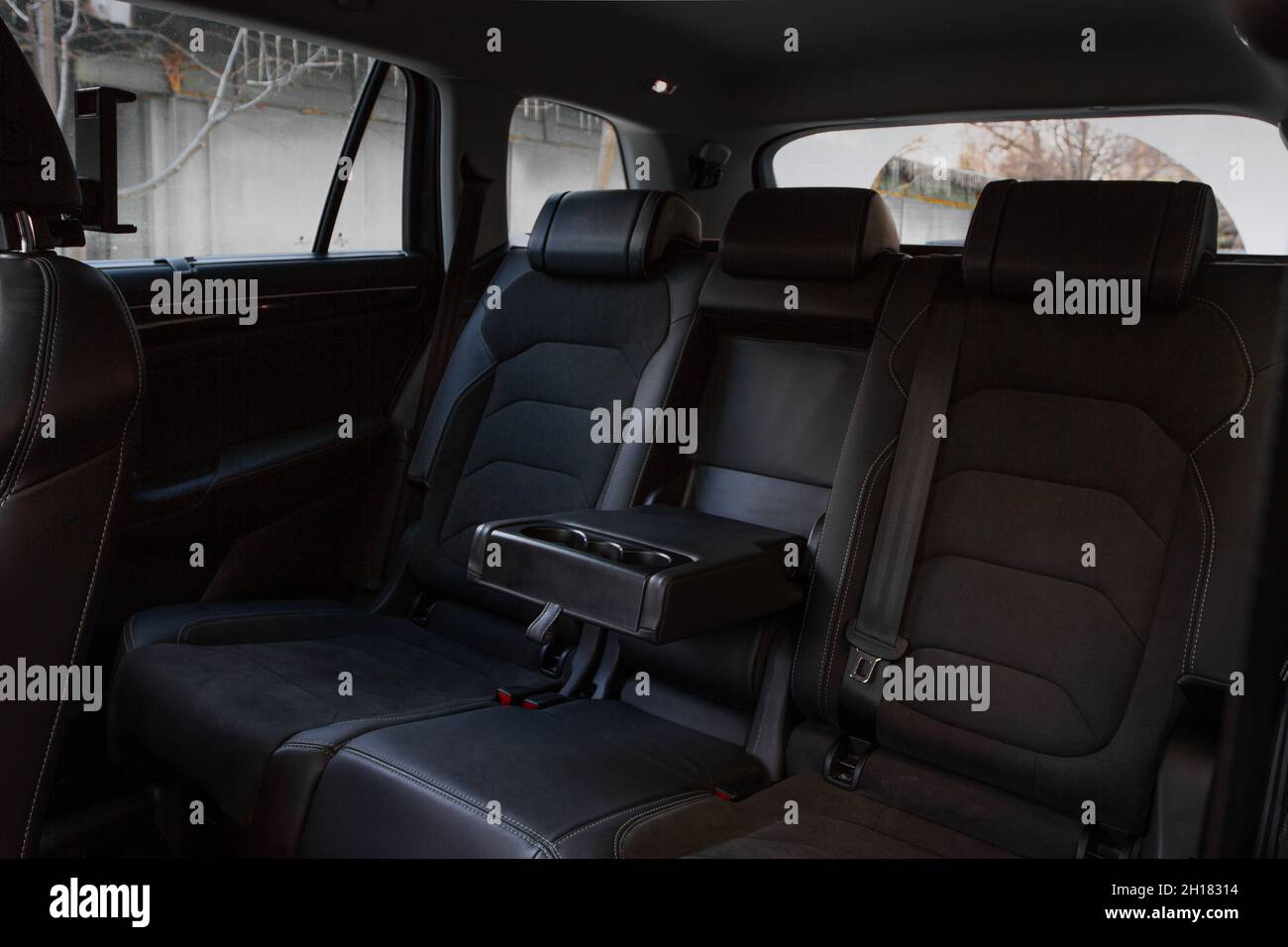 Folding seats and a cargo space inside suv car. Modern car interior ...