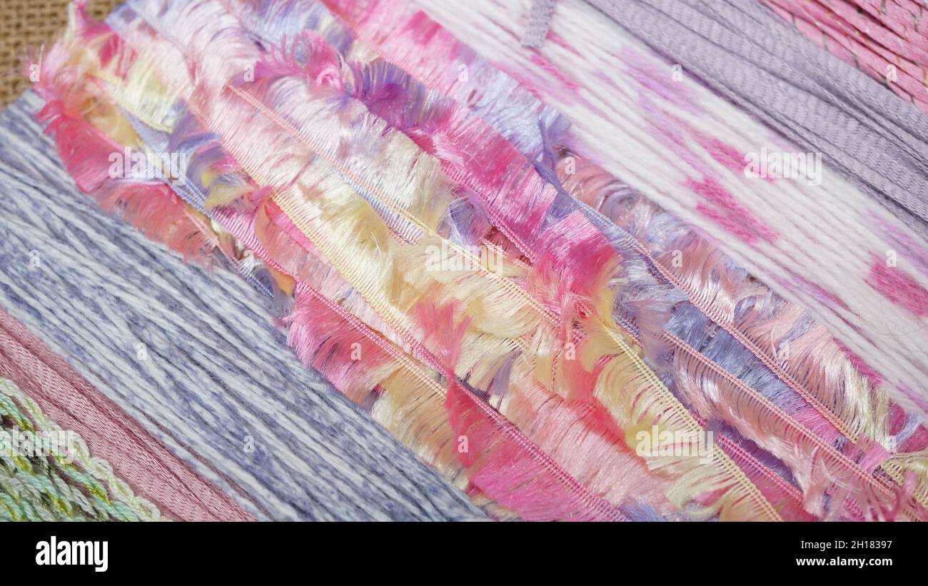 Weaving threads hi-res stock photography and images - Alamy