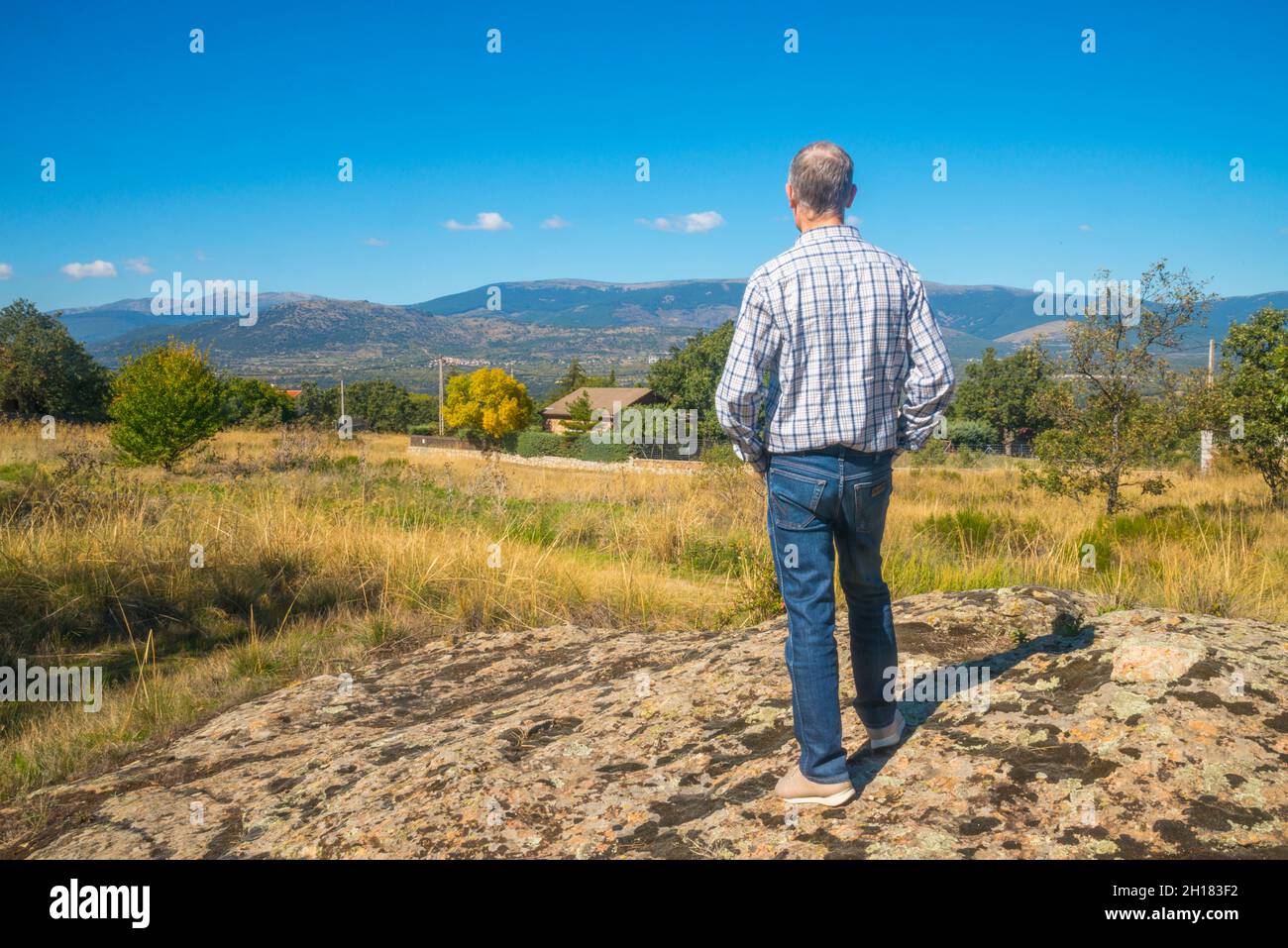 Man looking at the landscape. El Cuadron, Madrid province, Spain Stock ...