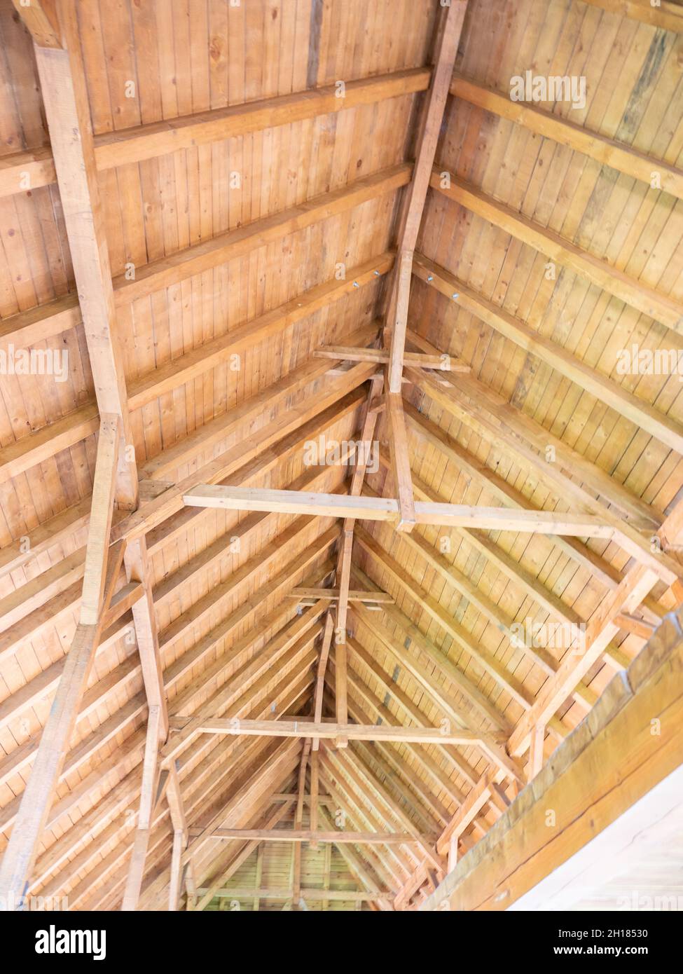 Wooden beams and ceiling, including partial carpenter's lining ...