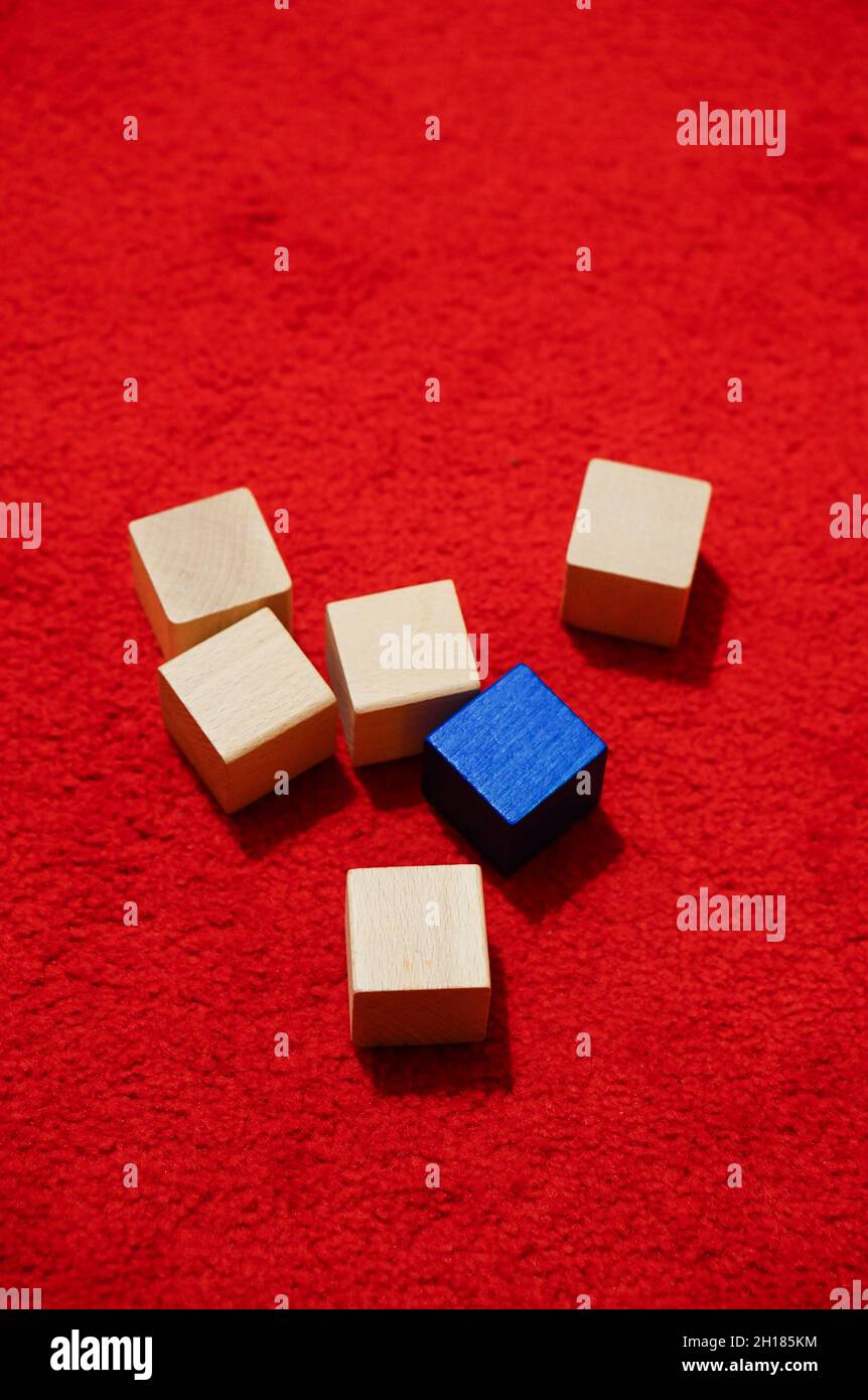 The wooden blocks on red carpet Stock Photo - Alamy