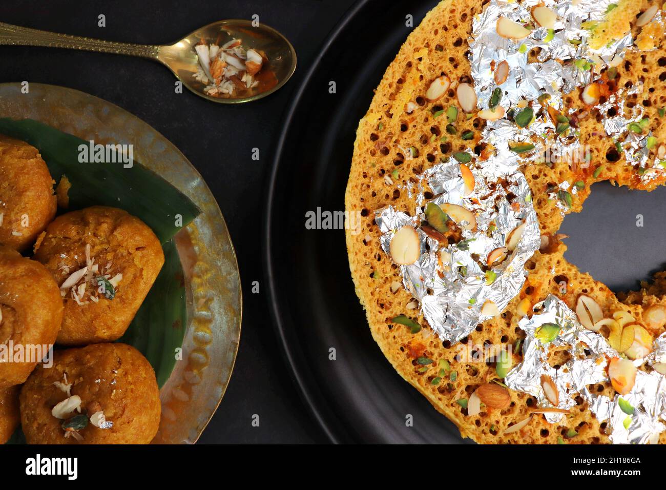 Rajasthani Ghevar. Ghewar is an Indian crunchy sweet dish made using ...