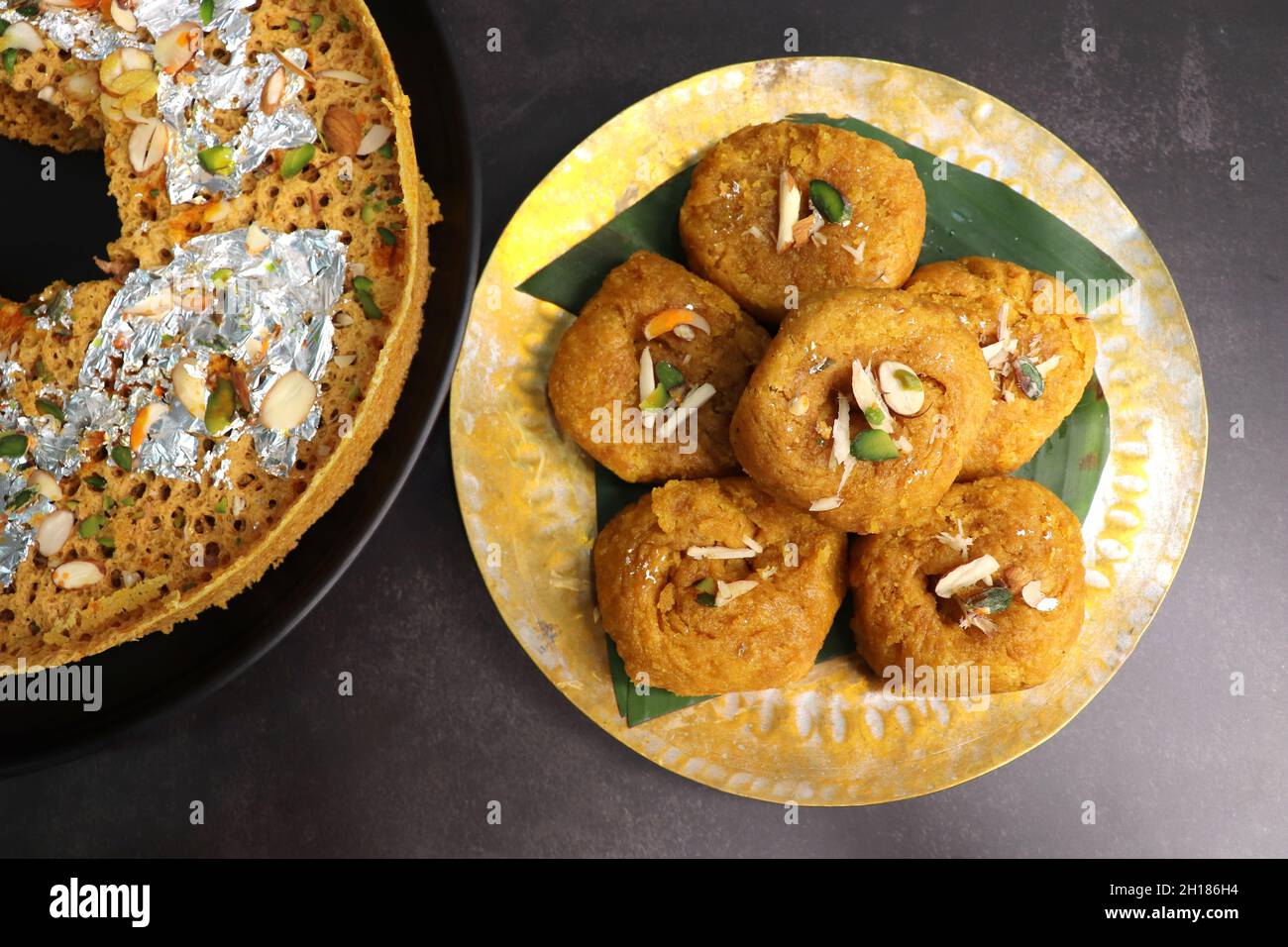 Rajasthani Ghevar. Ghewar is an Indian crunchy sweet dish made using ...