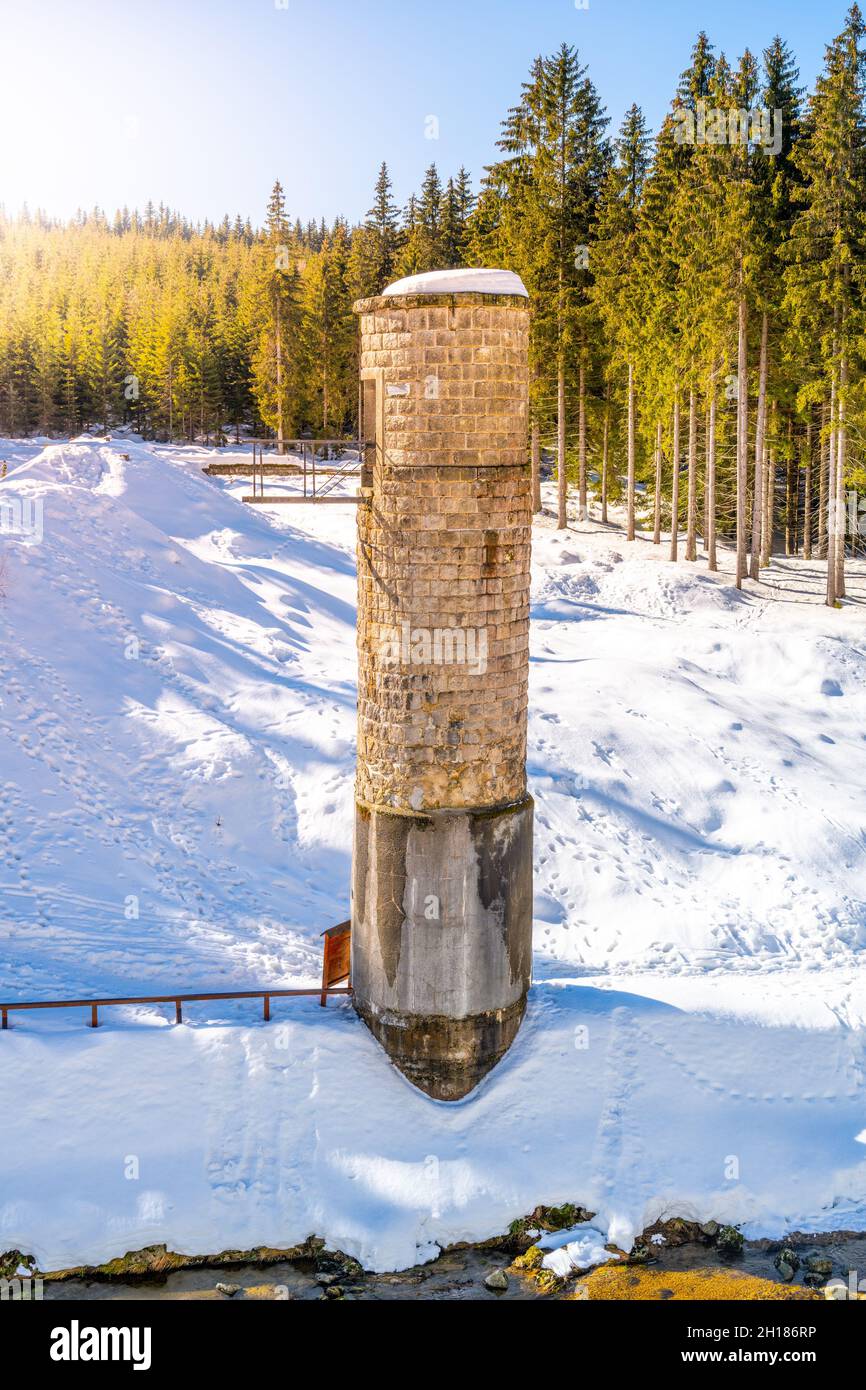 Broken dam in winter mountains Stock Photo - Alamy