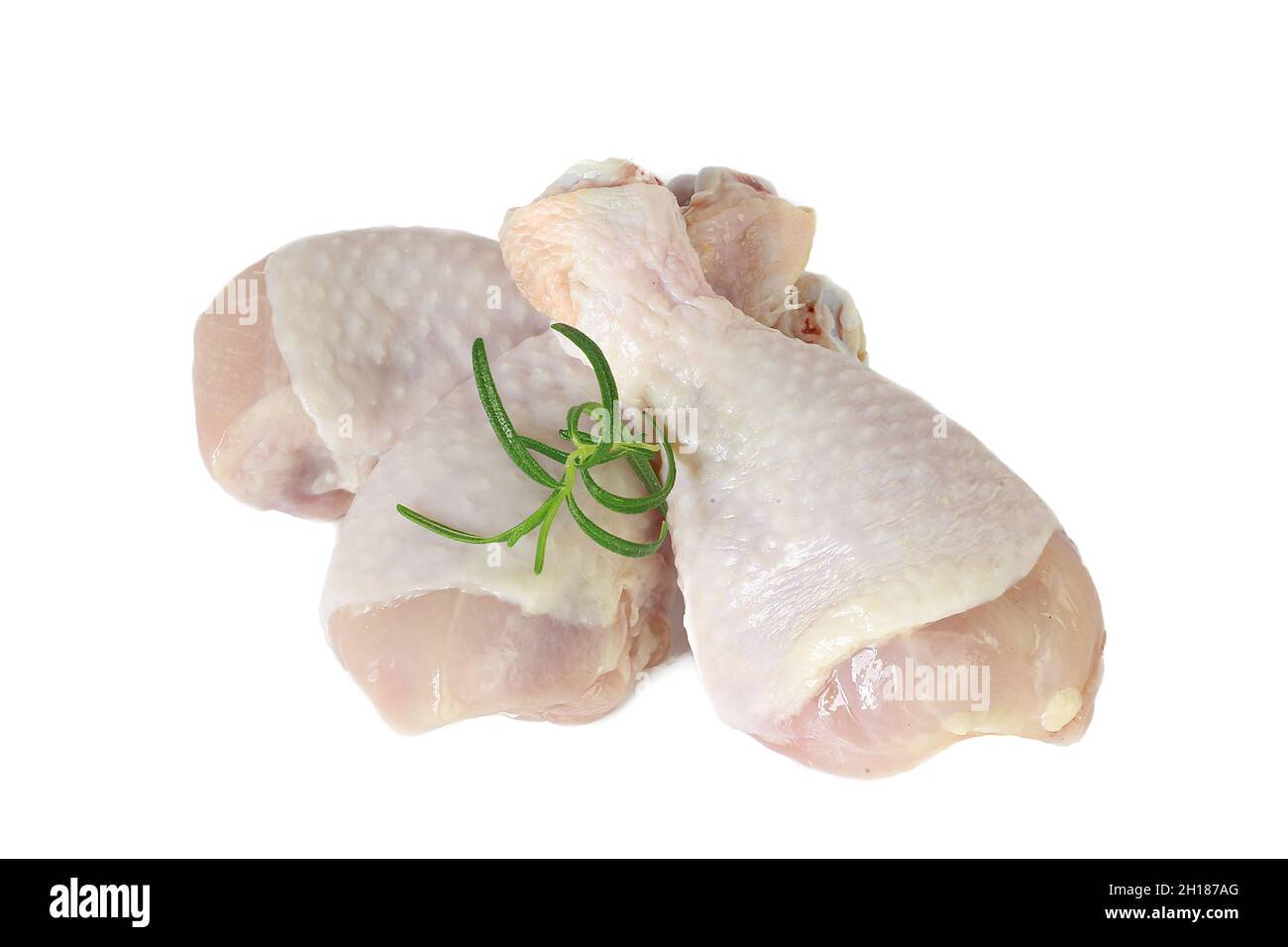 Raw chicken legs with rosemary isolated Stock Photo - Alamy