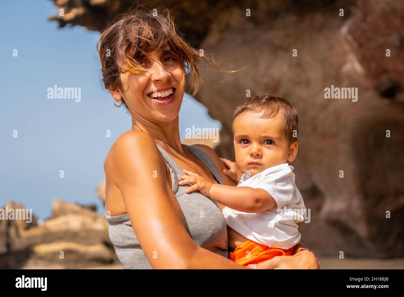 Baby crying beach hi-res stock photography and images - Alamy