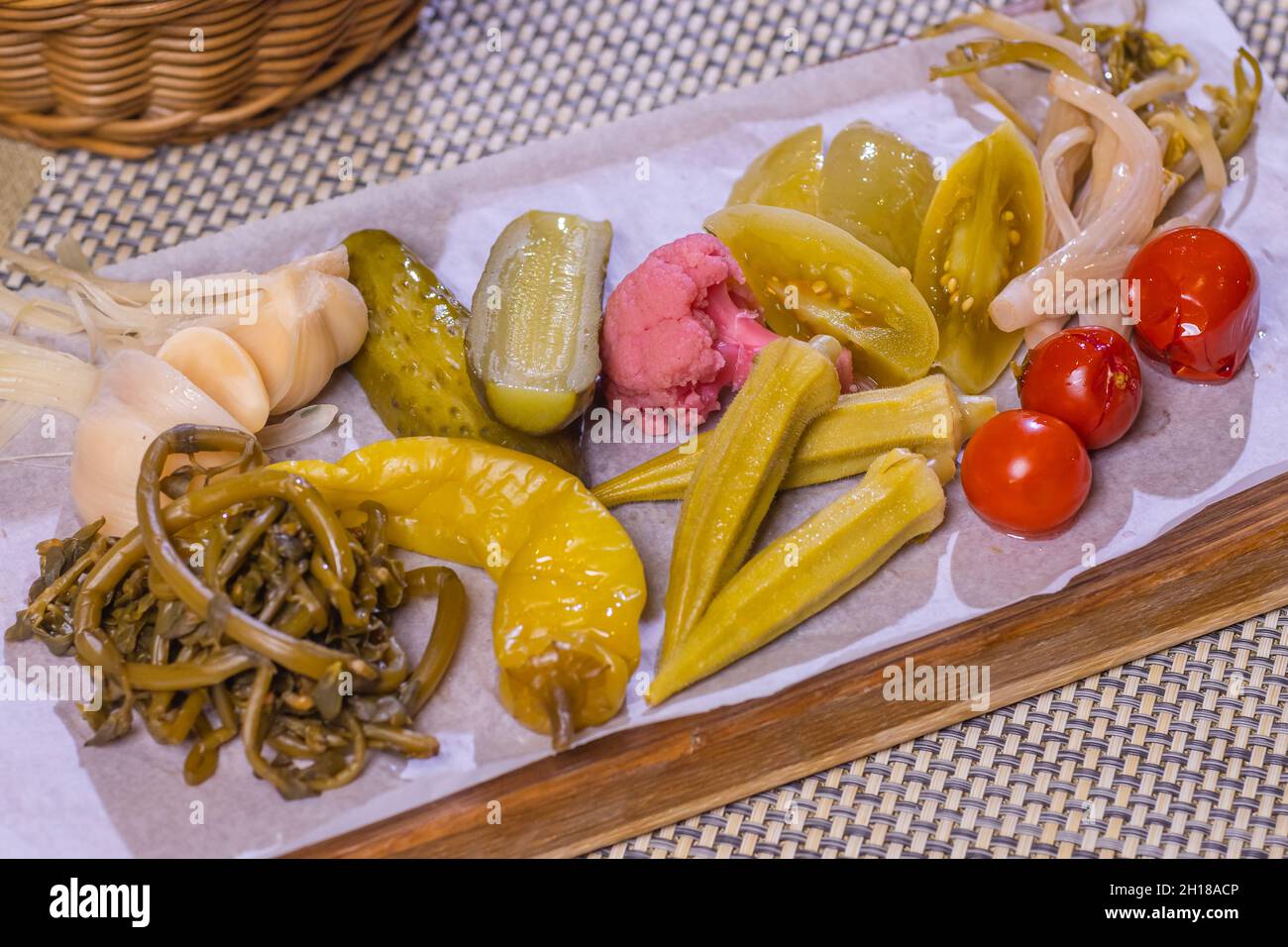 Different types of pickled vegetables on a white plate. Pickled ...