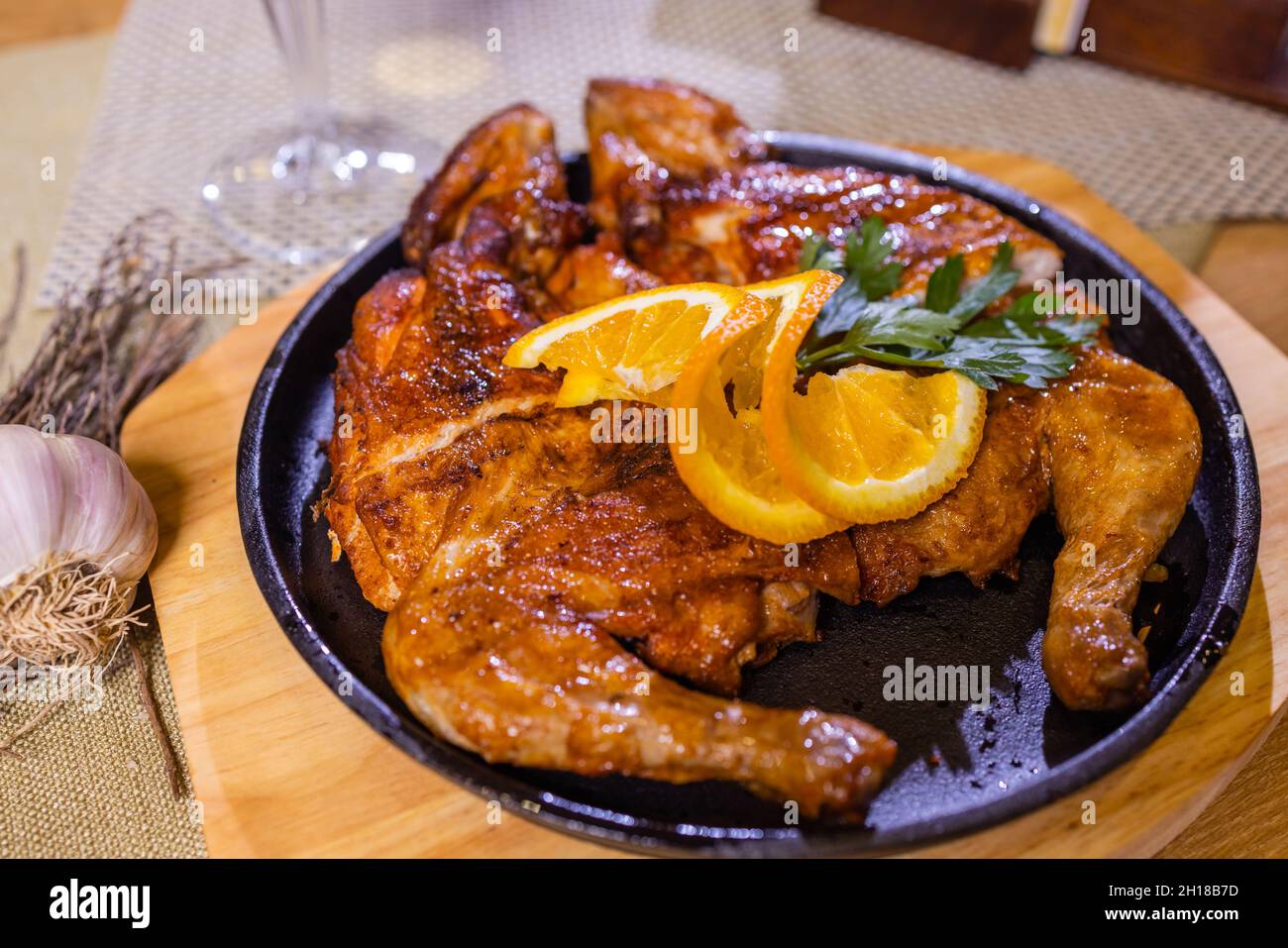 Plate with Chicken Tabaka in a pub Stock Photo - Alamy