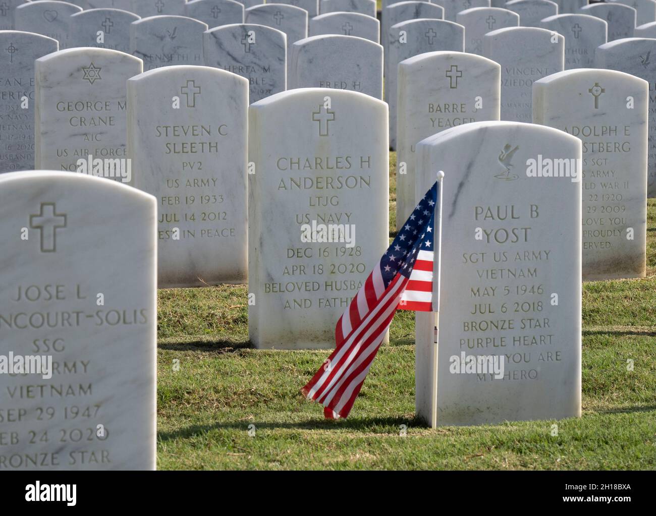 American Flag on gravestone in the Sarasota National Cemetery in ...