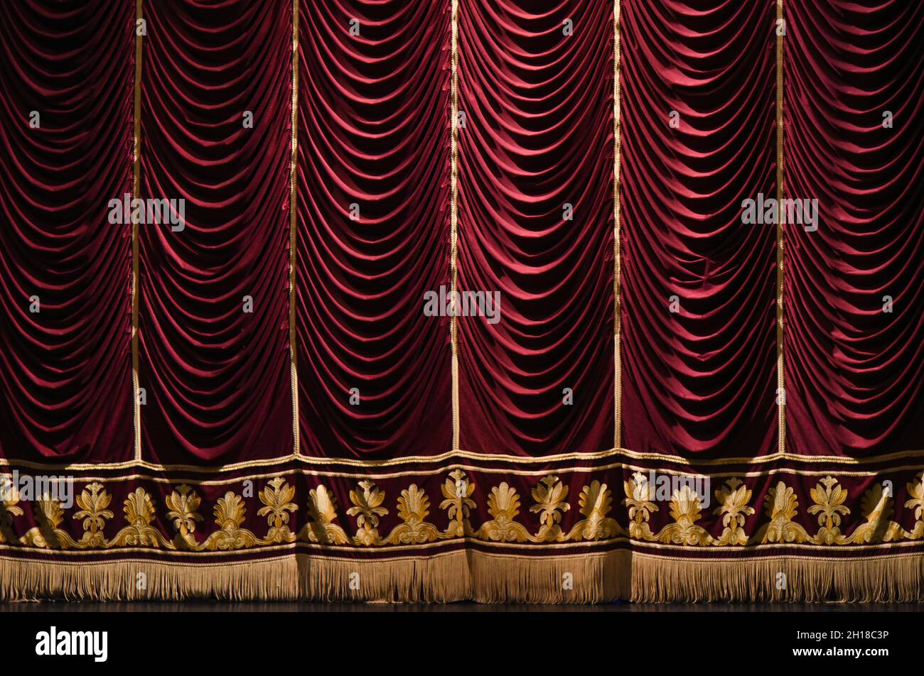 Closed theater curtain on stage in theater Stock Photo - Alamy
