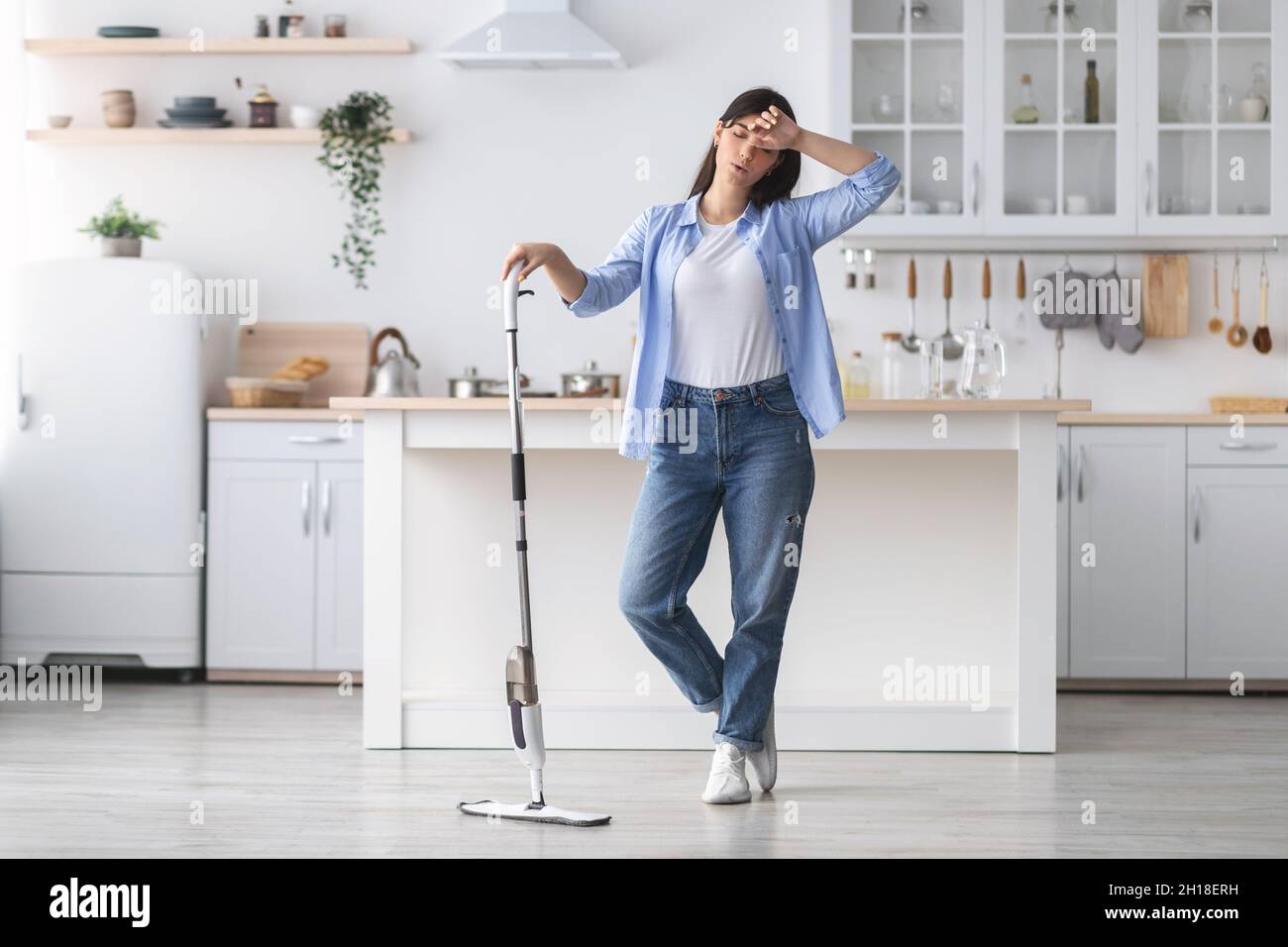 Cleaning lady mop hi-res stock photography and images - Alamy