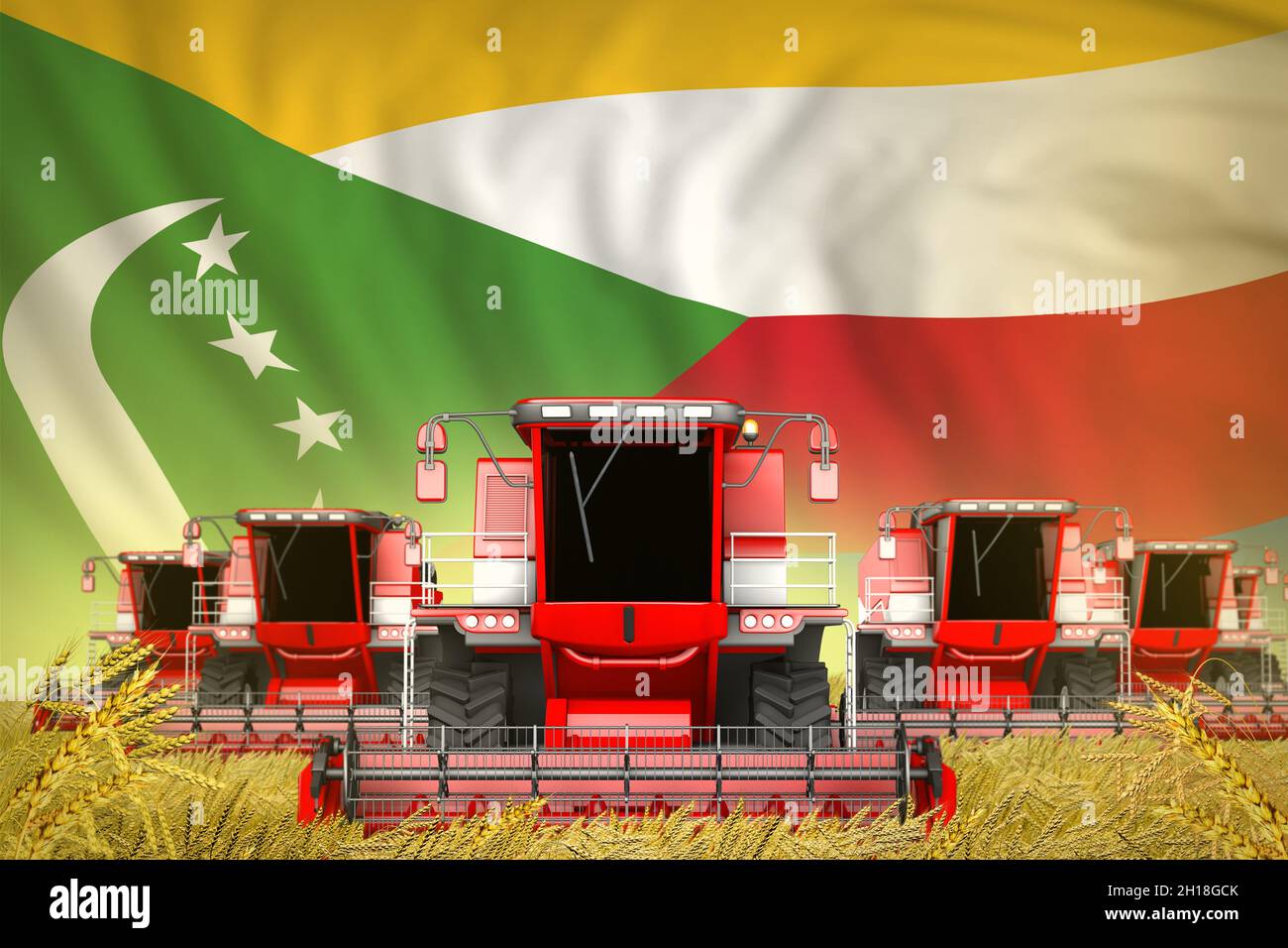 some red farming combine harvesters on grain field with Comoros flag ...