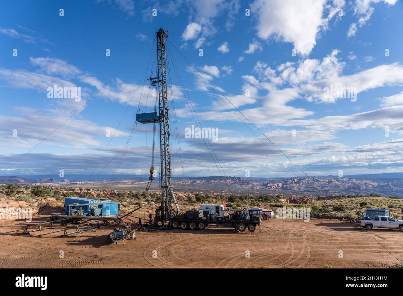 A pulling unit or workover rig on an oil well in Utah. Behind are the ...