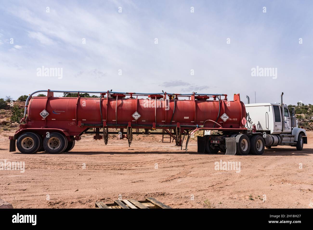 An acid tanker carrying acid for acidizing an oil well to restore ...