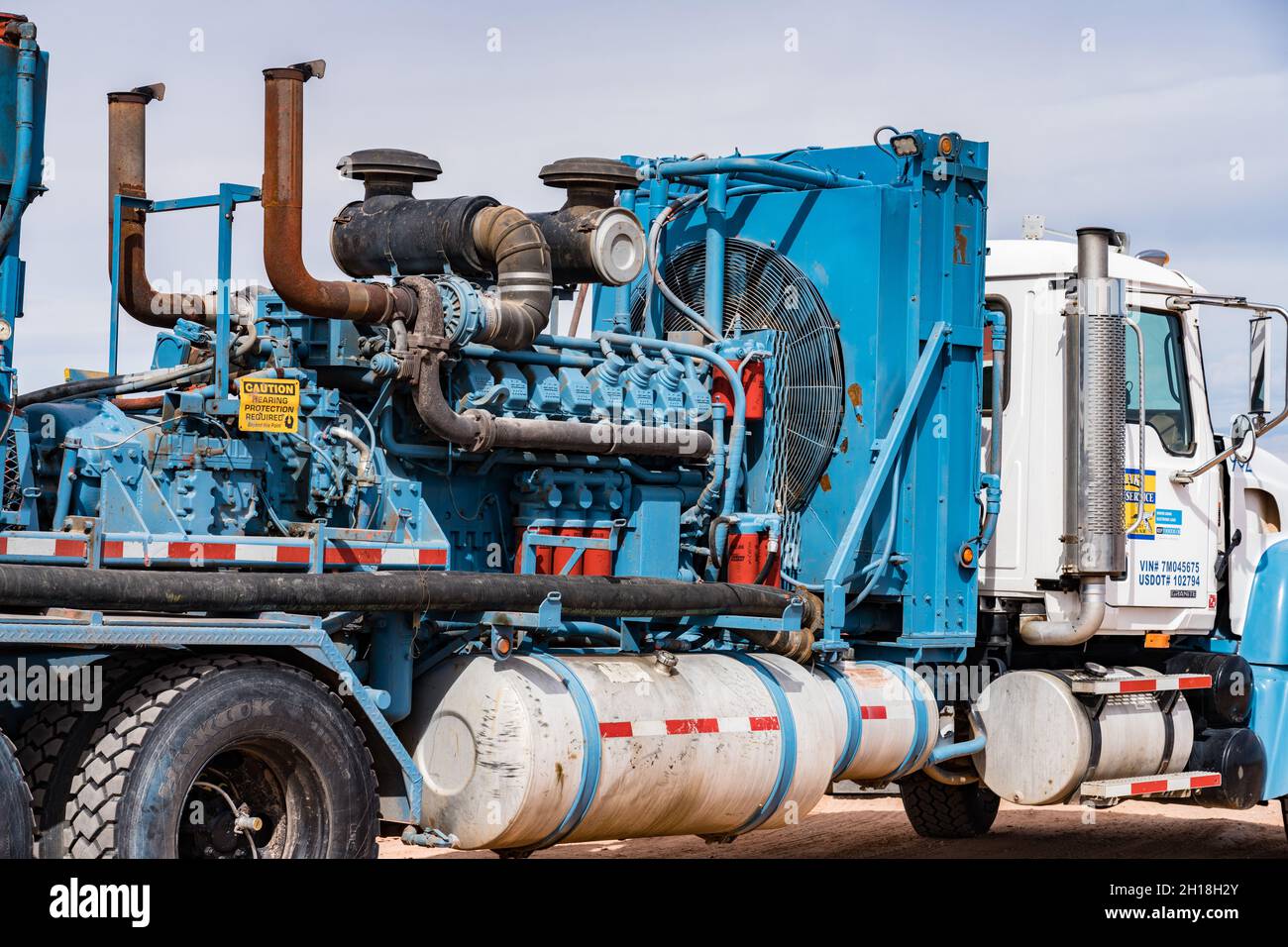 An acid pump truck for pumping acid down an oil well to dissolve ...