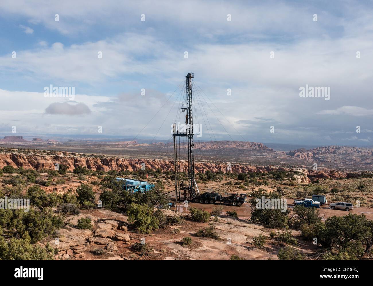 A pulling unit or workover rig on an oil well in Utah. Behind are the ...