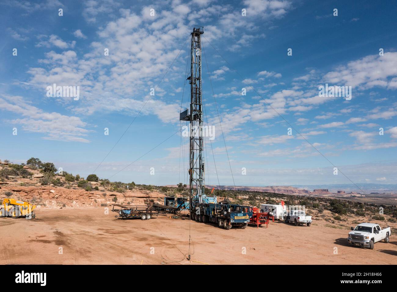 A pulling unit or workover rig on an oil well in Utah. Behind are the ...