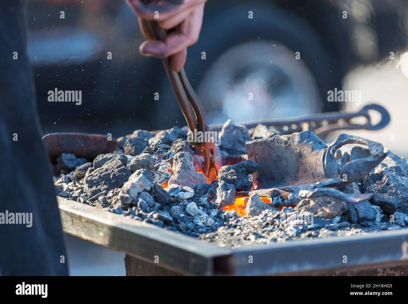 Old fashioned blacksmith furnace with burning coals Stock Photo - Alamy