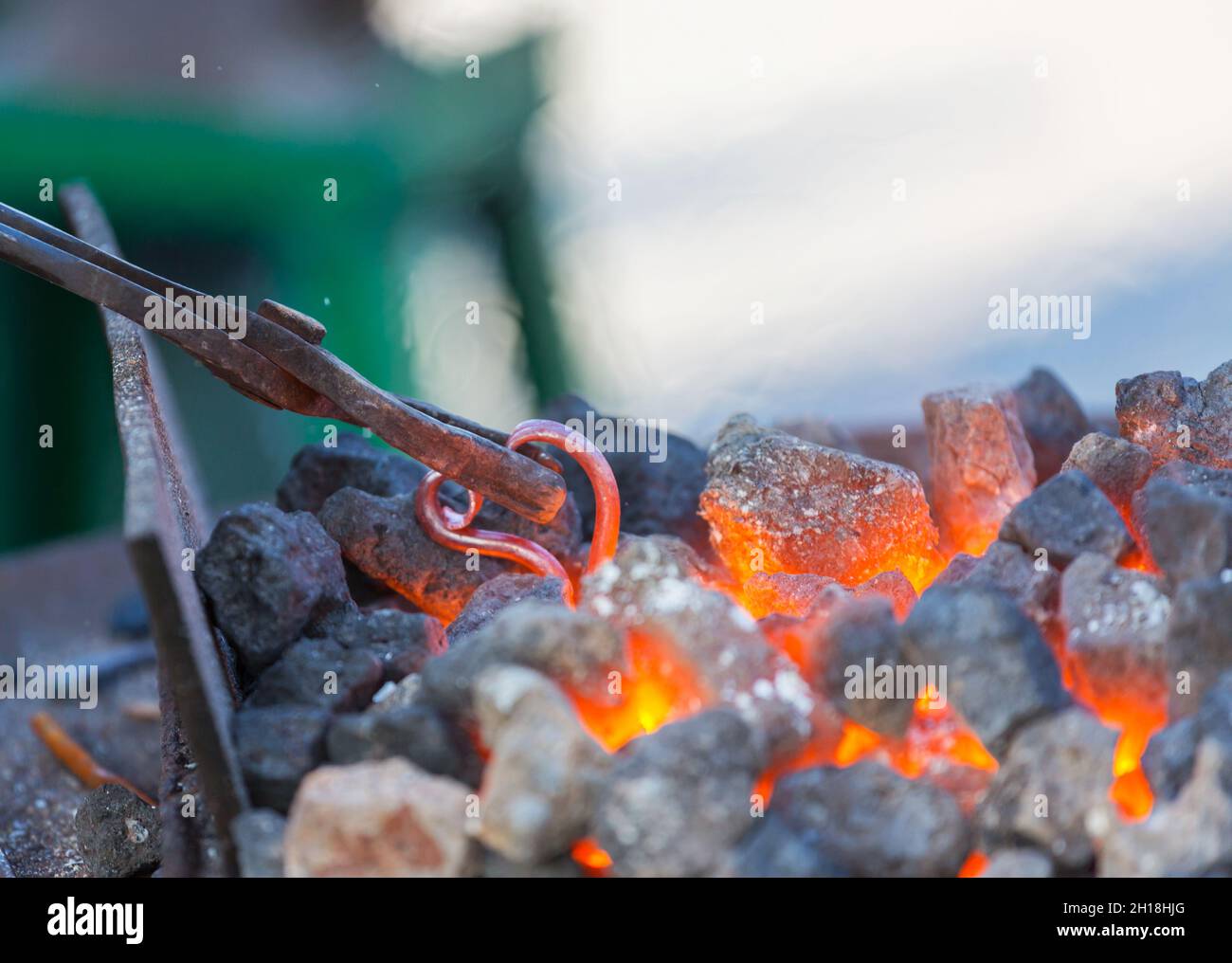 Old fashioned blacksmith furnace with burning coals Stock Photo - Alamy