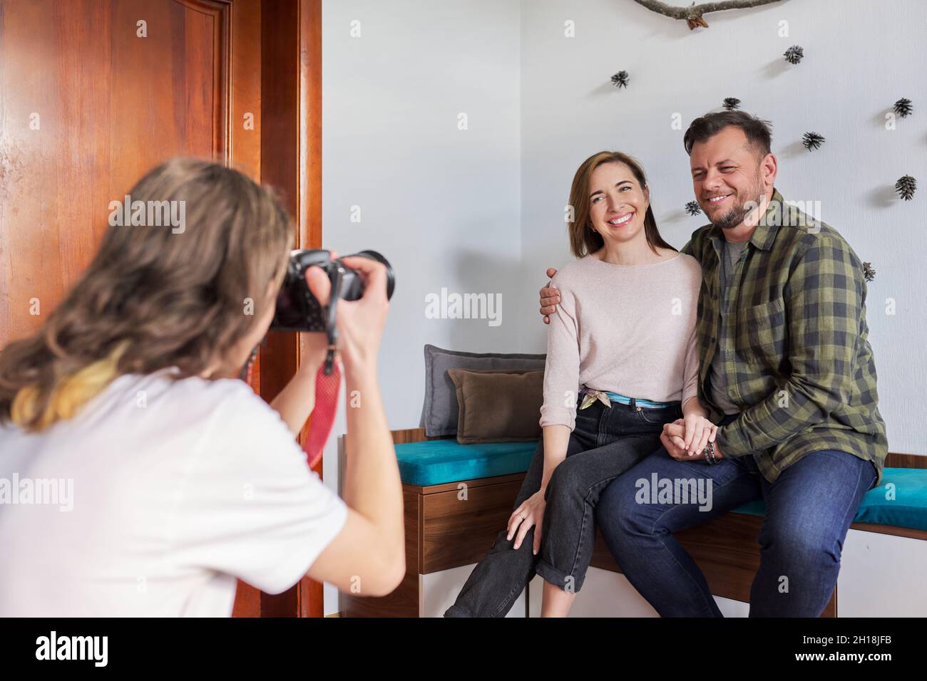 Family holiday date, happy middle-aged couple embracing posing looking ...