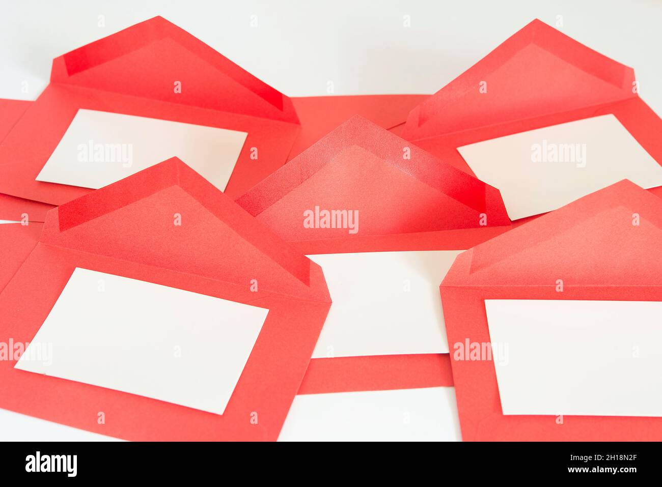 red letter envelope on white background Stock Photo - Alamy