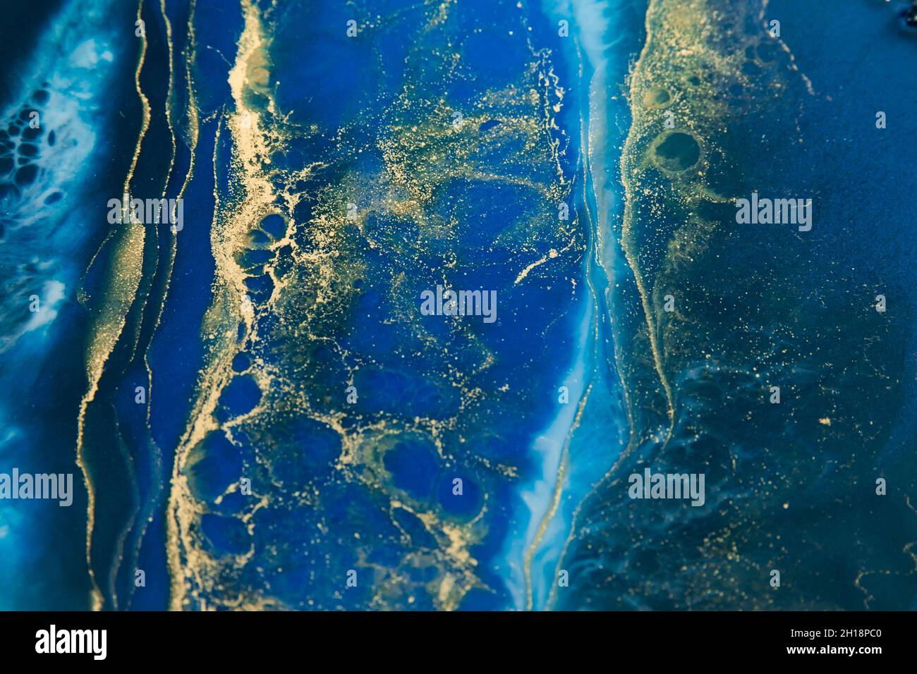 Resin art with deep blue and golden colors. Epoxy effect background ...