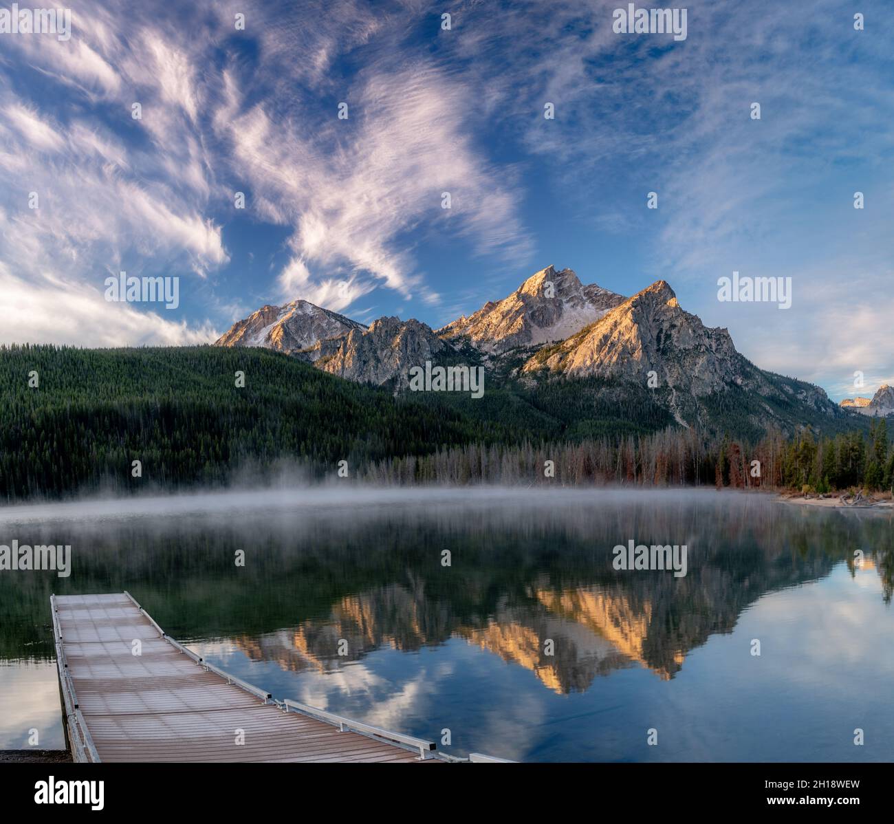 McGowan Mountain reflection in Stanley Lake with new boat dock Stock Photo - Alamy