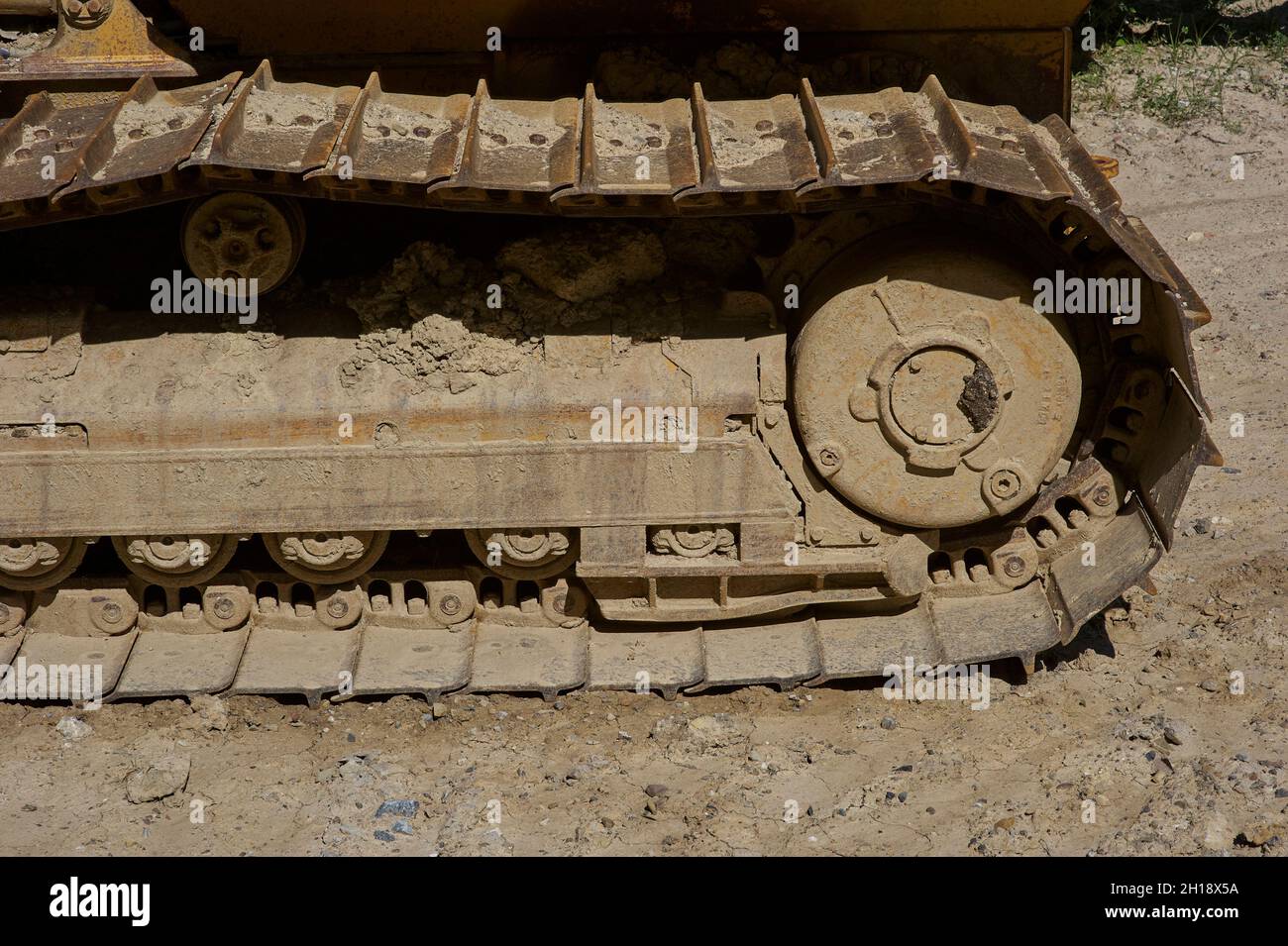Bulldozer steel tractor treads Stock Photo - Alamy