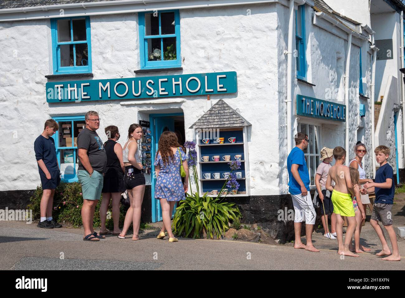 Mousehole, Cornwall, England, UK. 2021. Holidaymakers shopping in ...