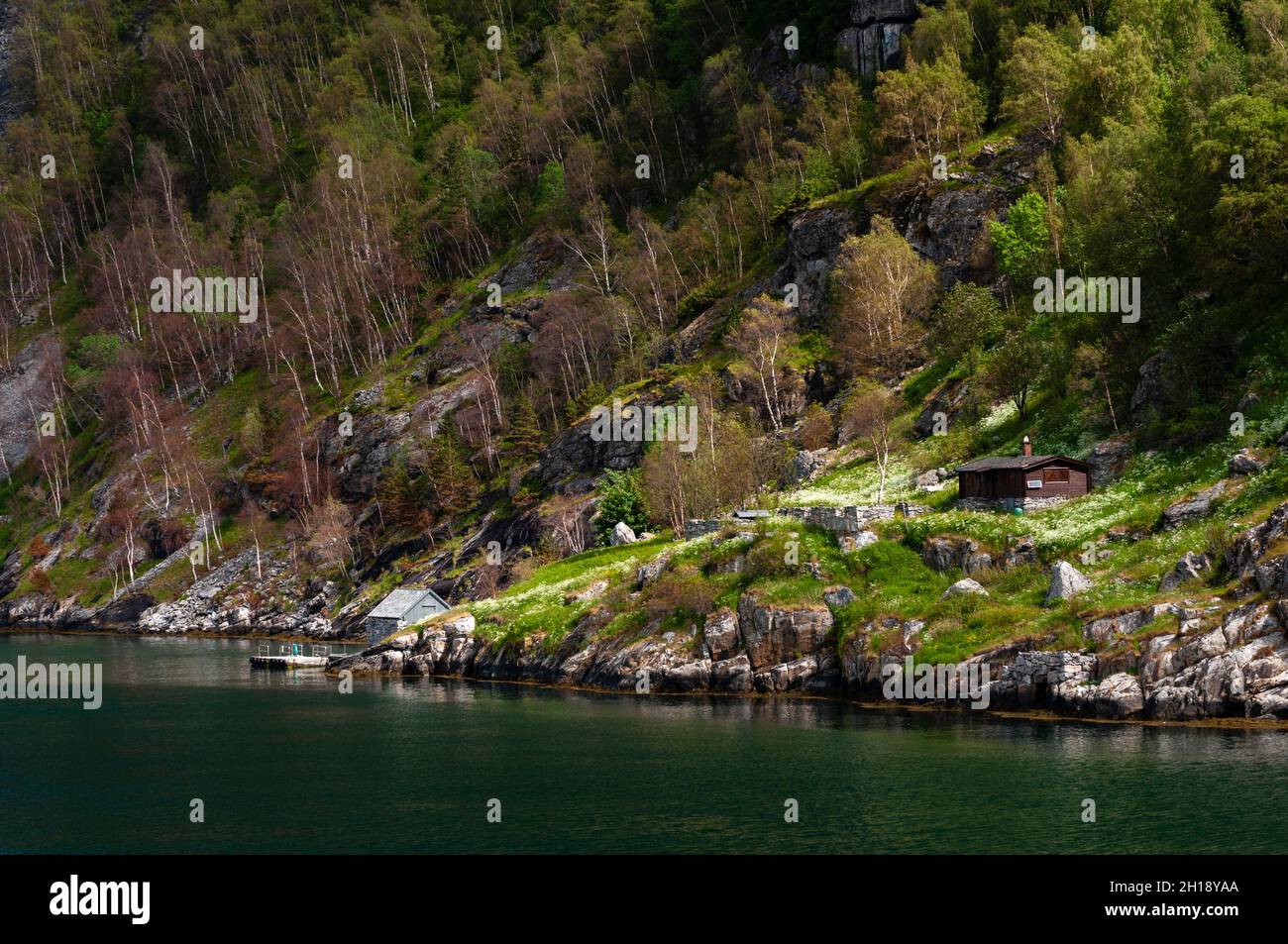 Primitive farm buildings and houses built into the steep rugged ...