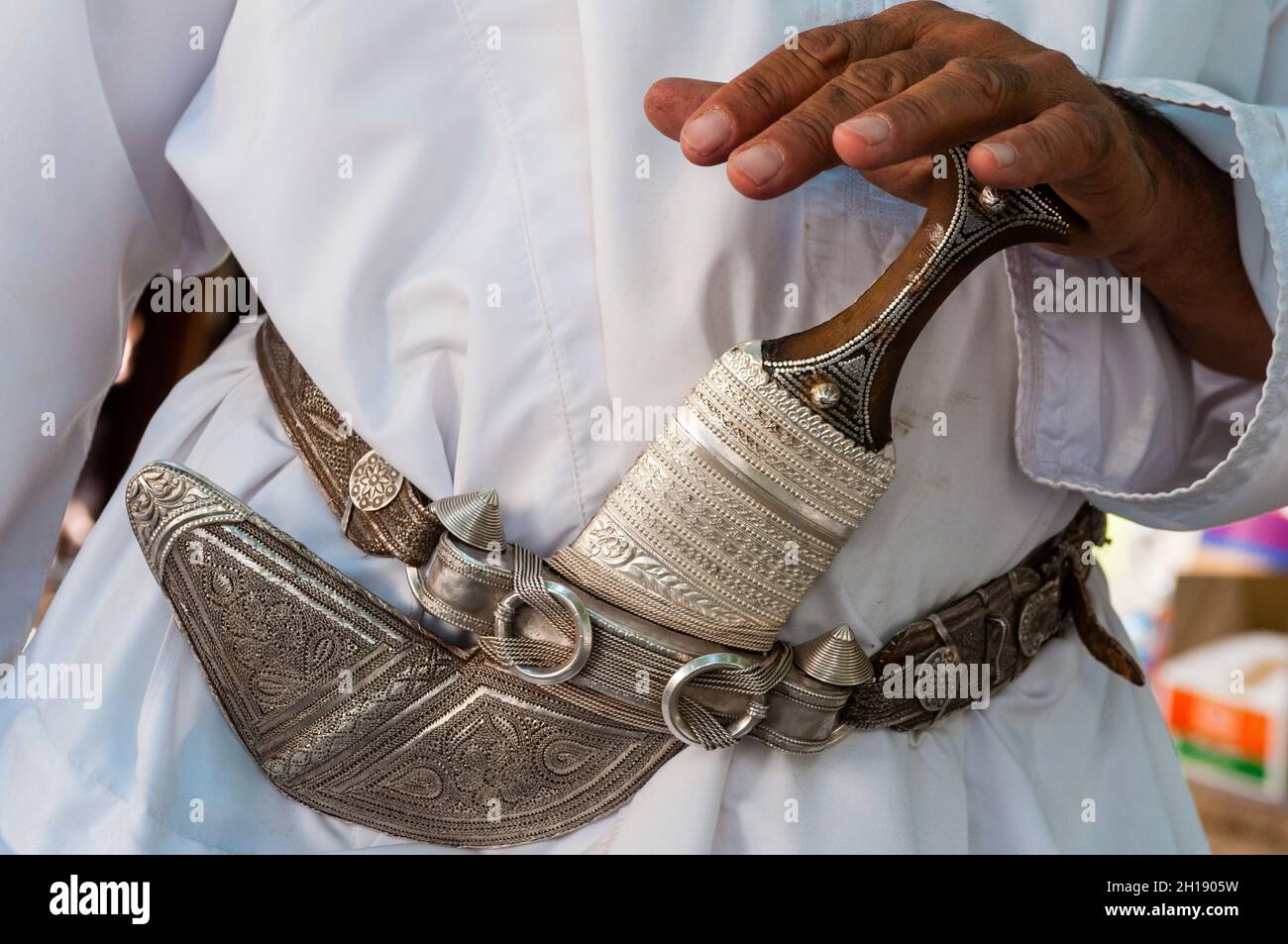 An Omani man wearing a jambiya, the traditional Omani knife. Nizwa ...