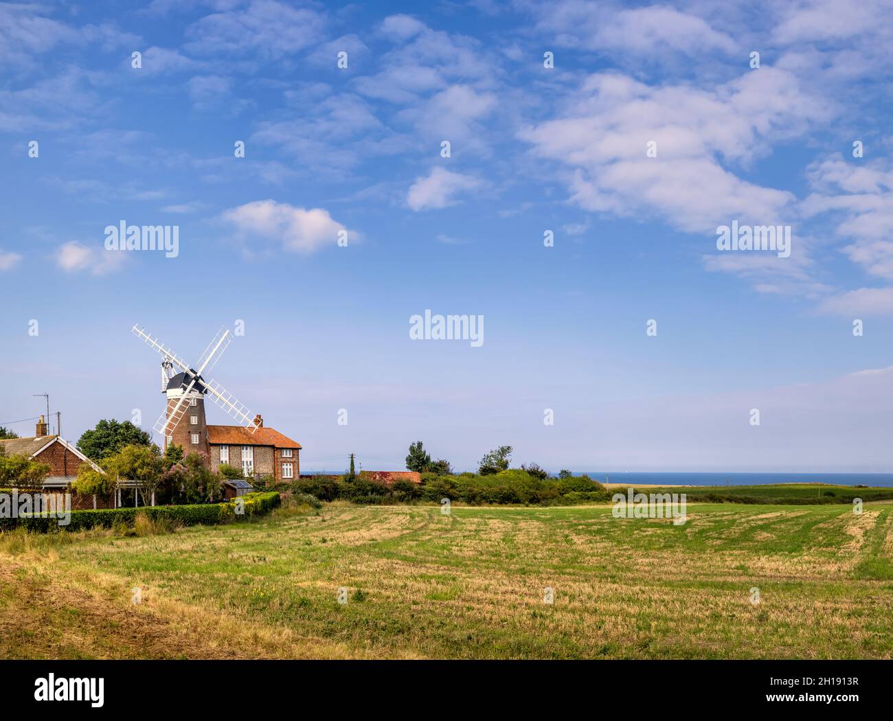 An old clifftop windmill now converted to a residential house and ...