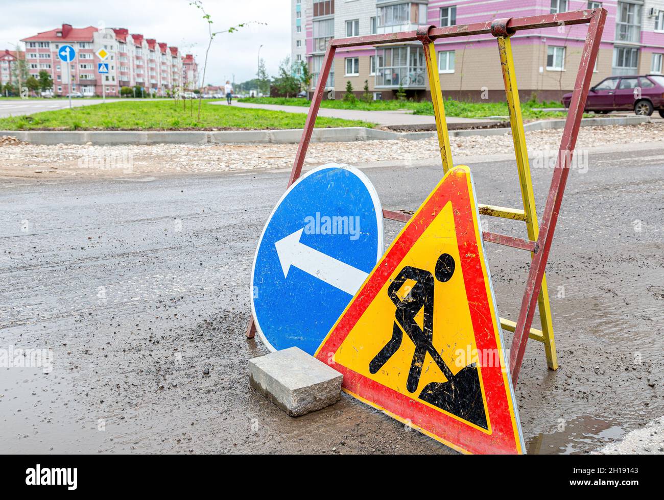 Road works traffic sign at the city street. Under construction road ...