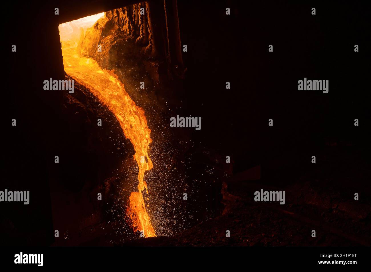 Discharge of liquid metal from a metallurgical furnace Stock Photo - Alamy