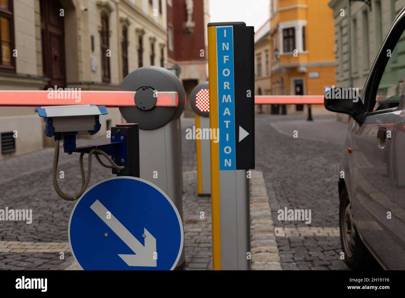 Automatic car barrier in residential area parking lot Stock Photo - Alamy