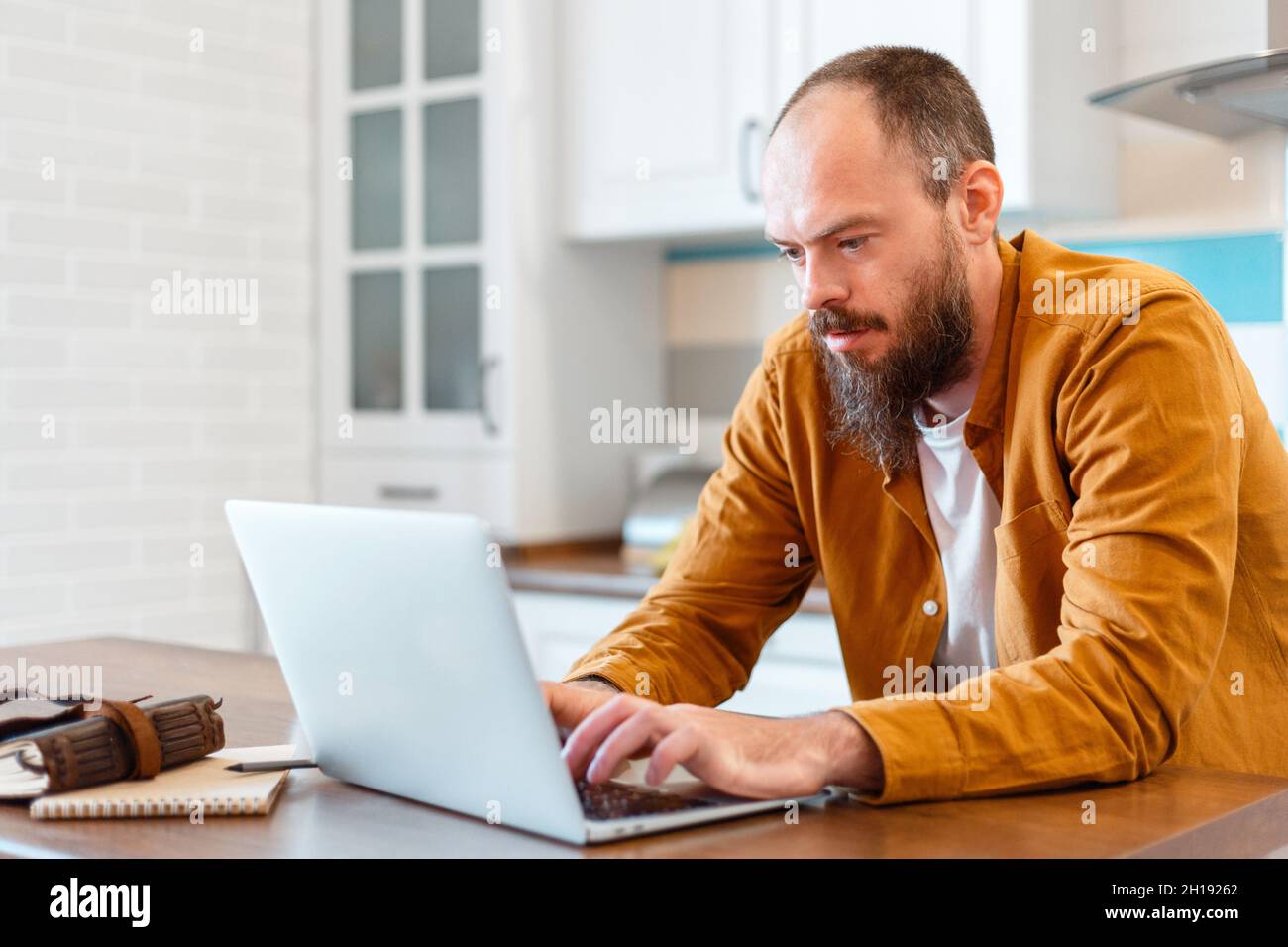 Calm bearded business man using hi-res stock photography and images - Alamy