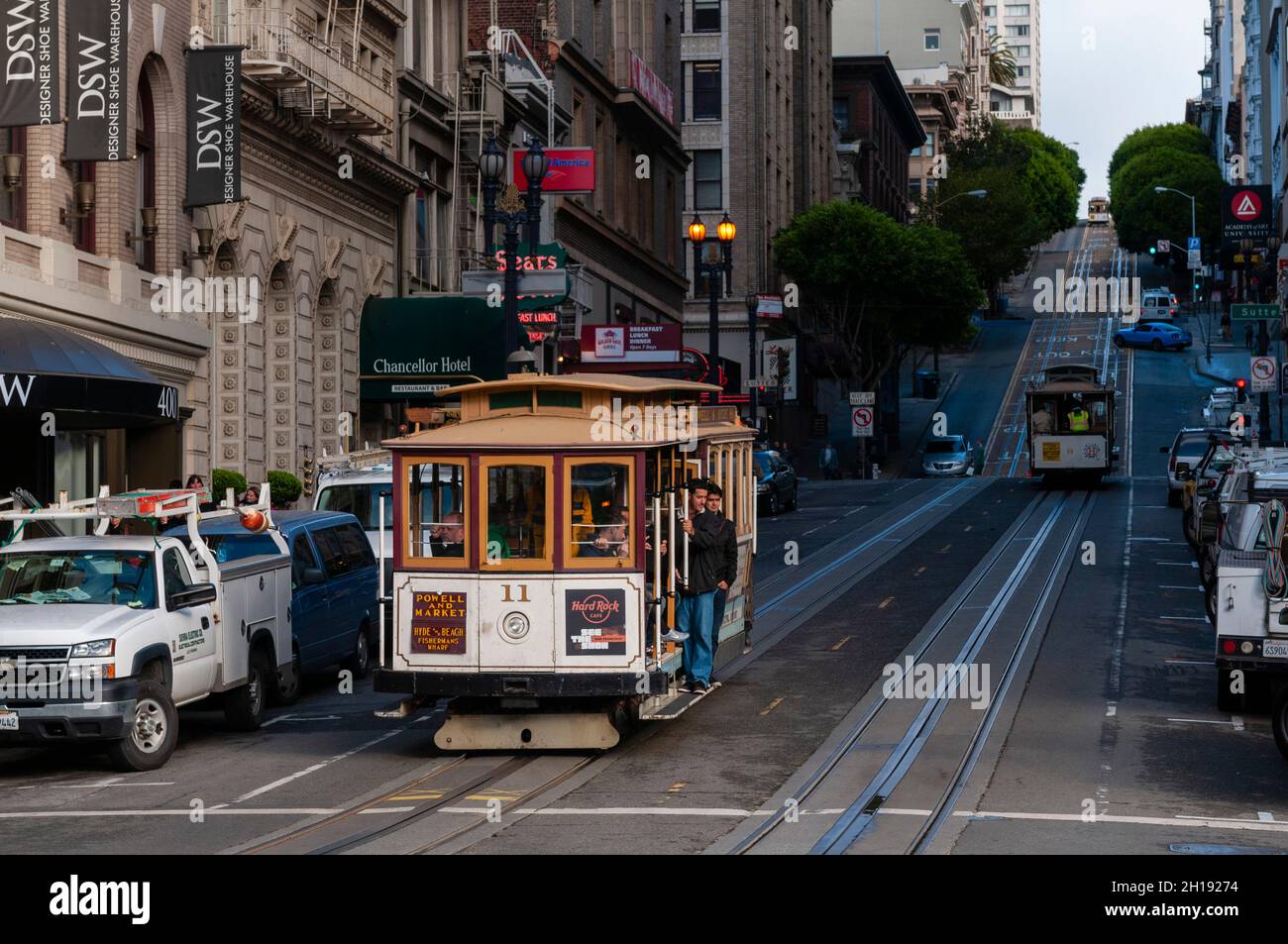 A trolley car and other traffic on Powell Street at the corner of Union ...