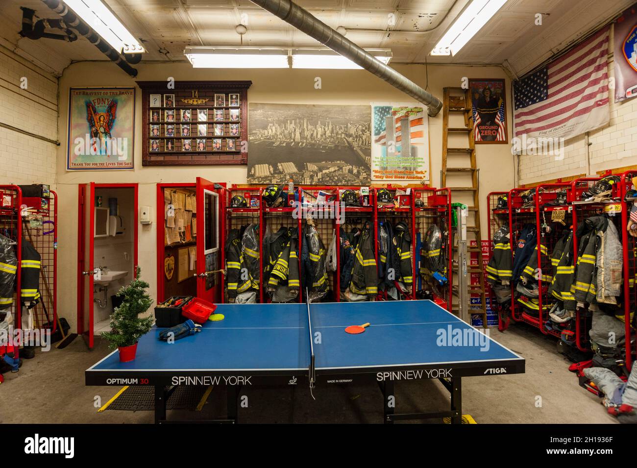 An empty room, the bathroom and the office doors open, the hanging ...