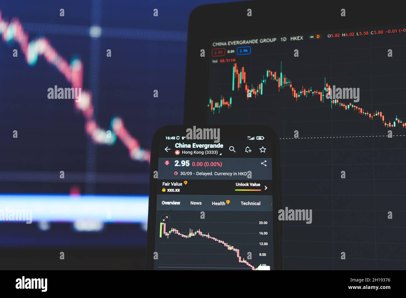 Evergrande on stock market screens. The Evergrande Group or the ...