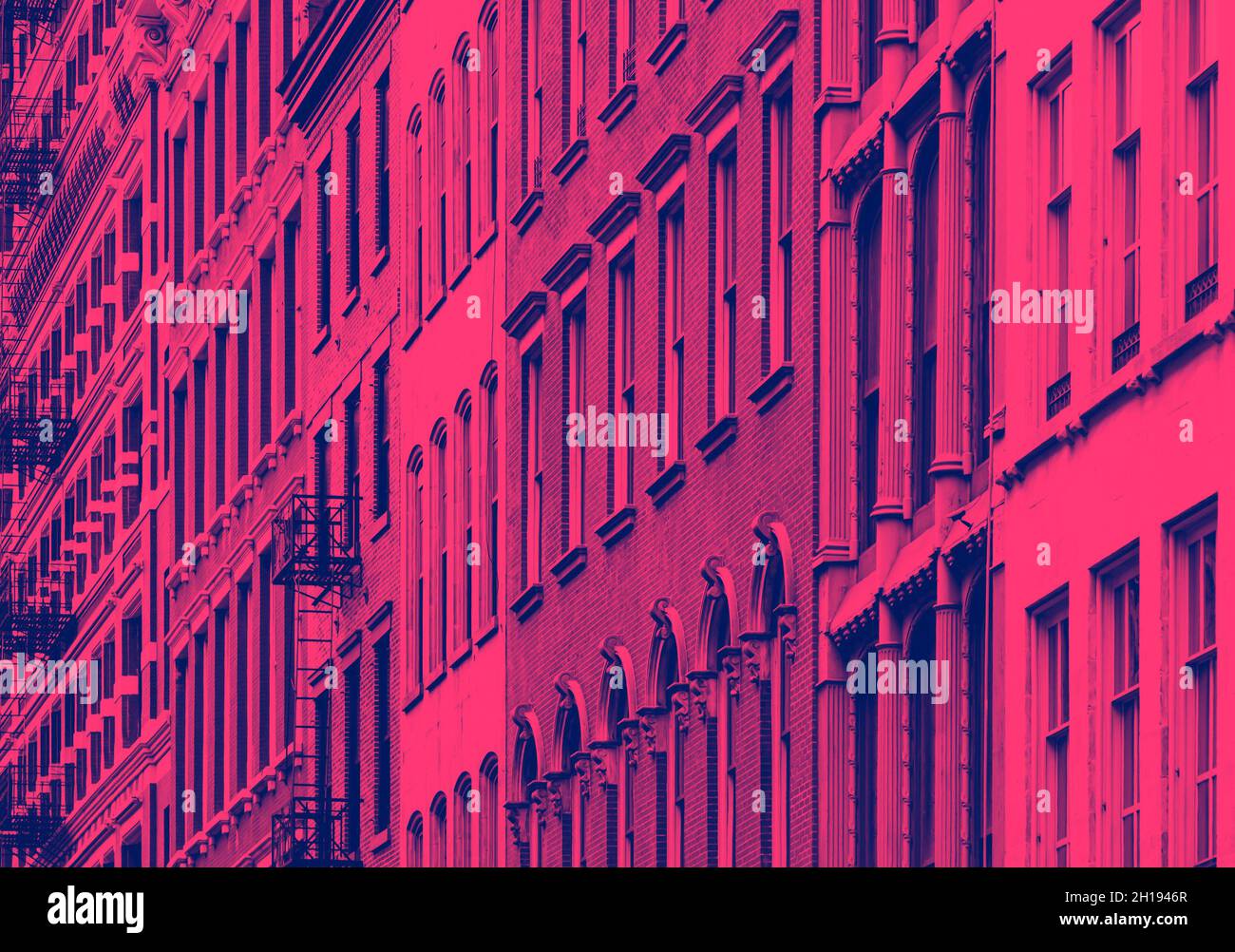 Old colorful buildings in SOHO Manhattan, New York City with pink and ...