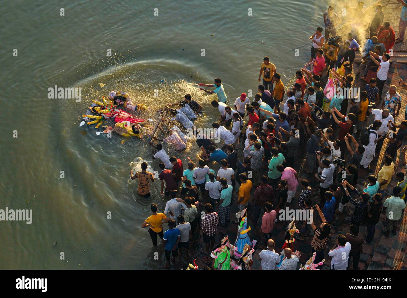 Goddess Durga immersion rituals at the bank of river Surma in Sylhet ...