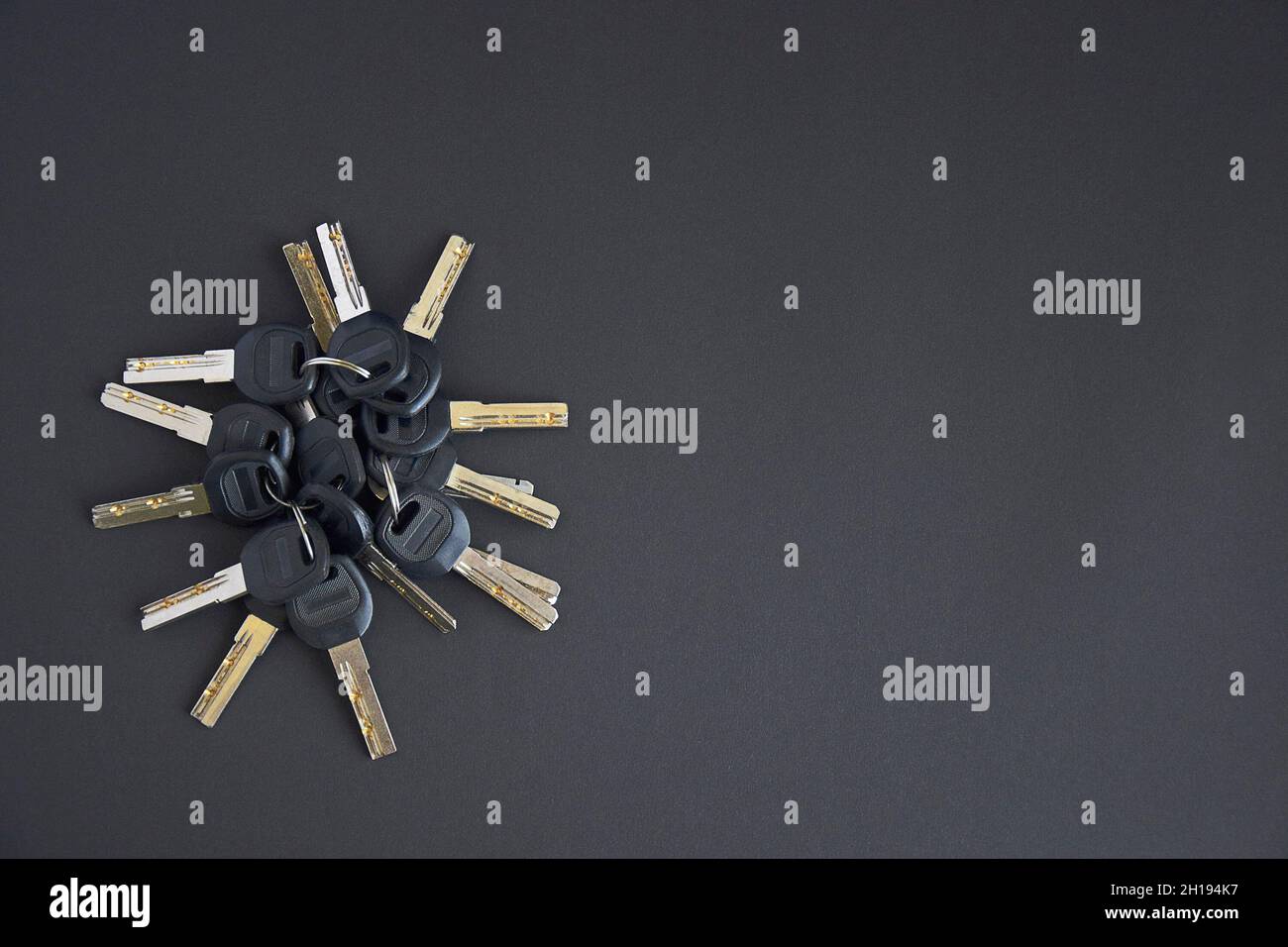 lot of shiny metal keys for the door held together using the ring on ...