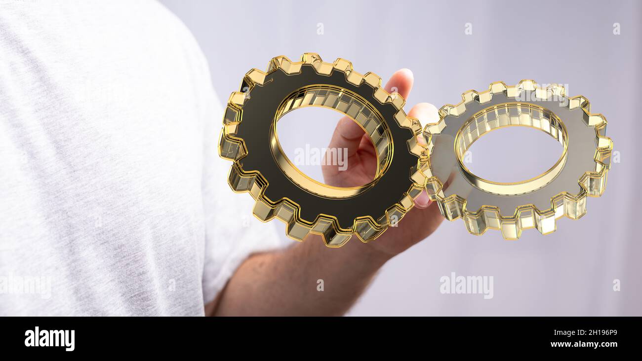 A human hand showing cogs and gear wheel mechanisms Stock Photo - Alamy