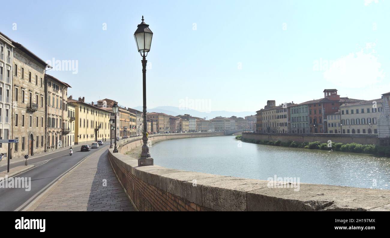PISA, ITALY - Sep 03, 2019: A beautiful view of the flowing River Arno ...