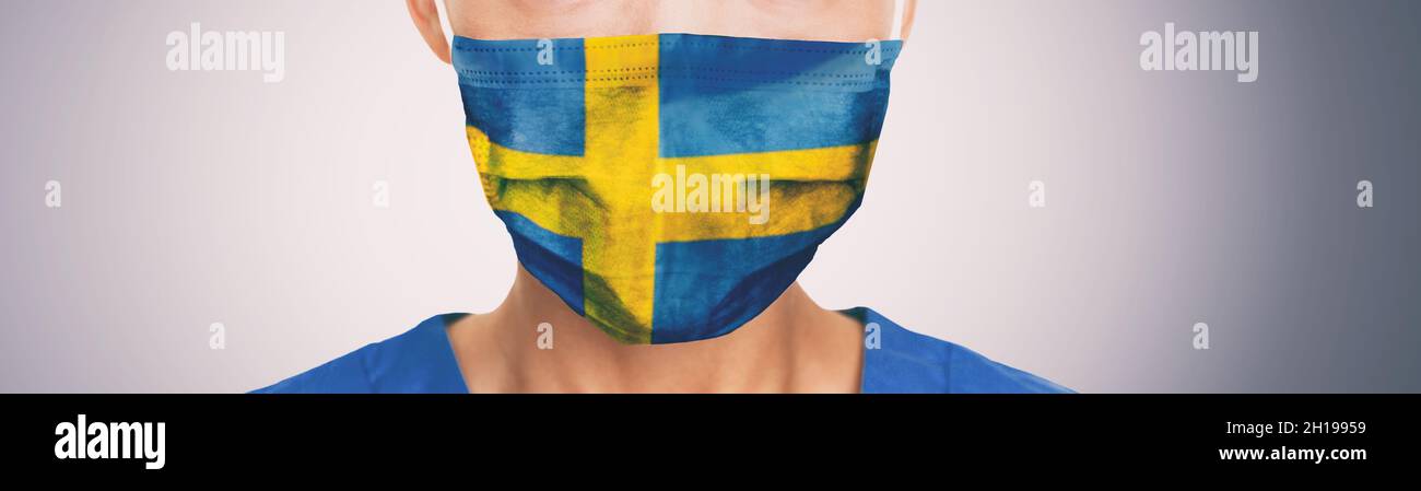 Sweden flag print on swedish doctor nurse man or woman face PPE on gray ...