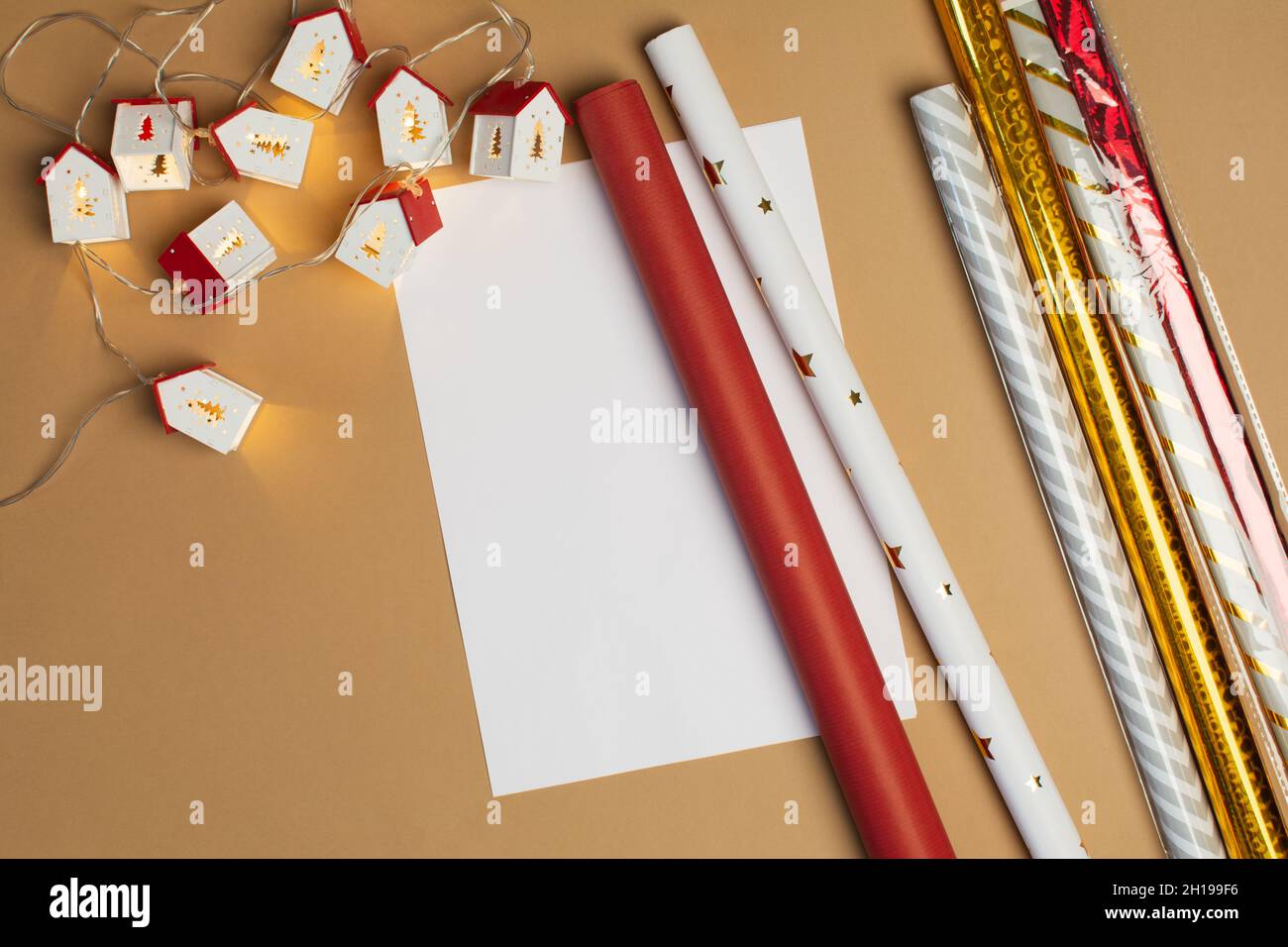 Blank paper for text with Christmas decoration on beige background ...