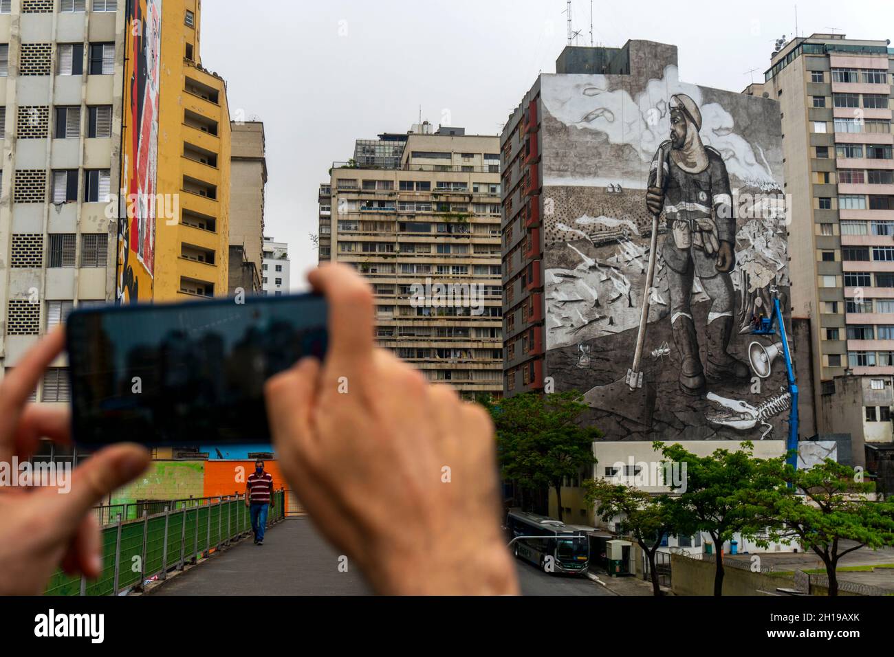 October 16, 2021: Brazilian artist and activist Mundano works on the ...